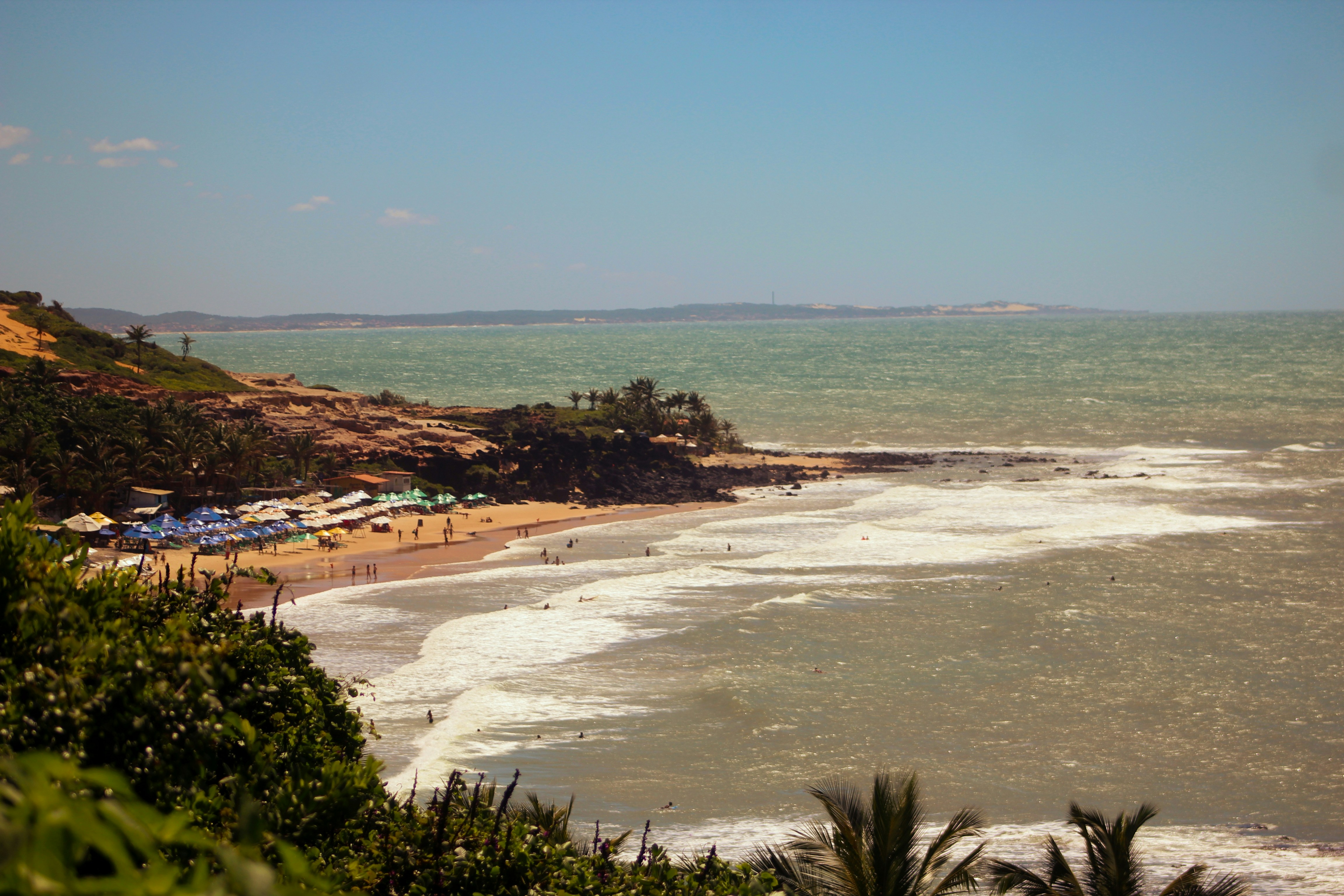 Coastal Cove: Beach, Cliff Park, and Far Horizon