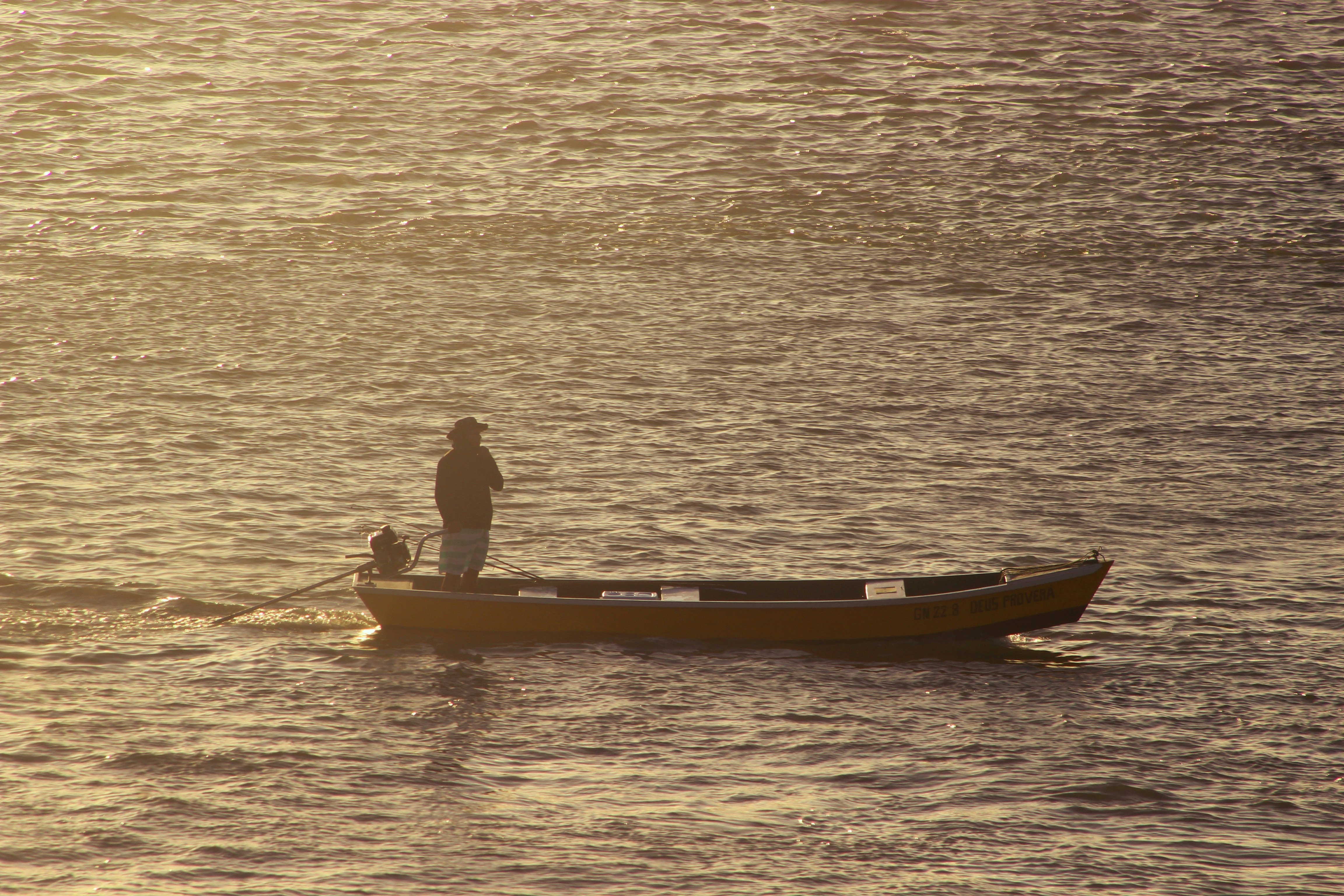 Boatside Silhouette at Golden Hour