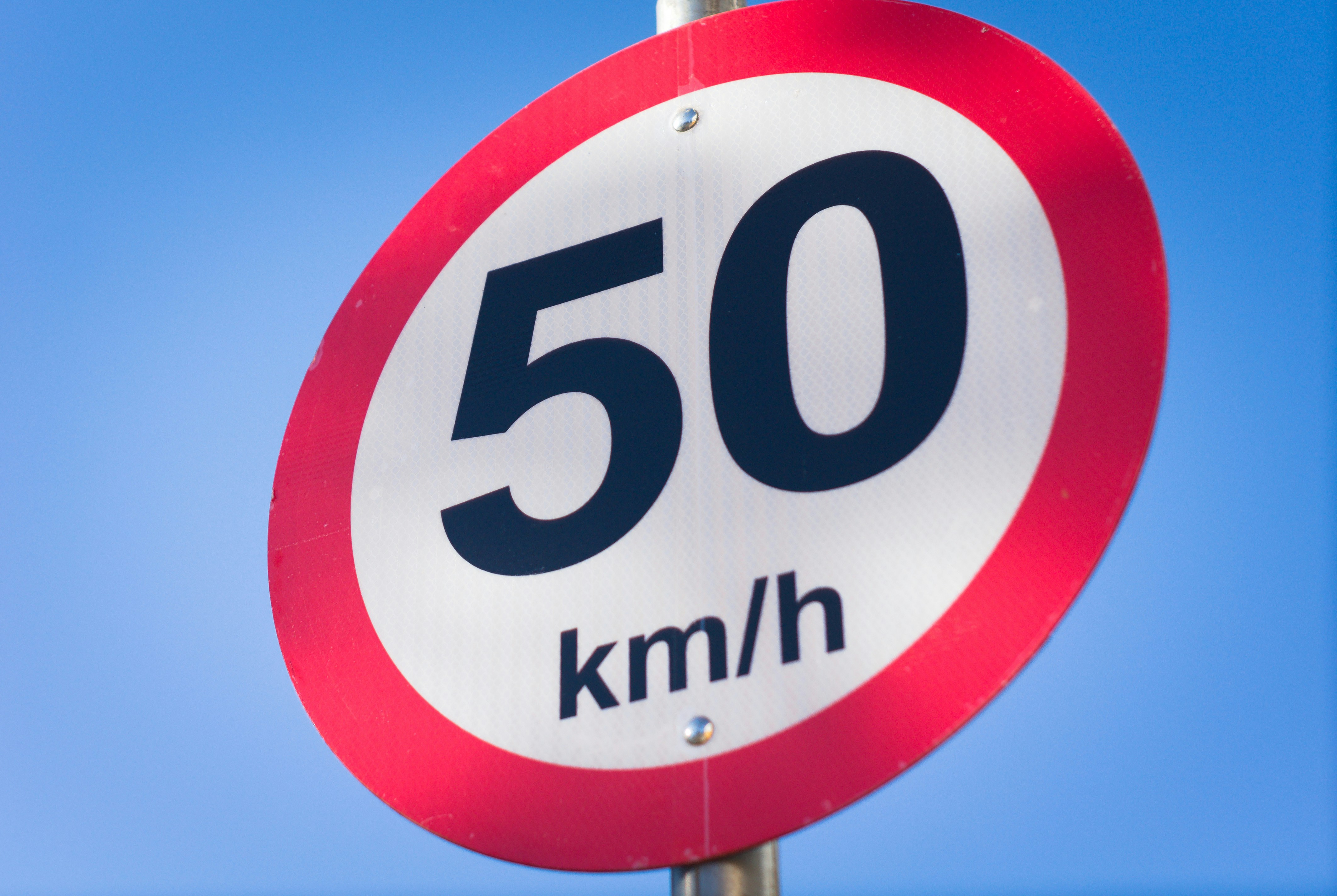 Speed Sign in a Clear Sky