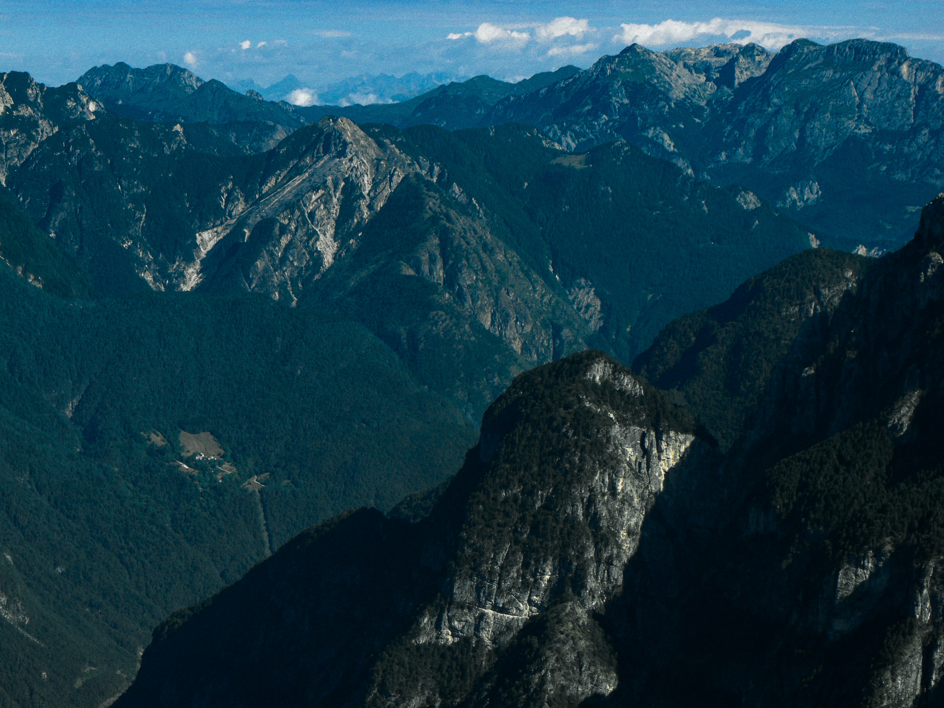 Cascading Valleys Under a Crystalline Alpine Sky
