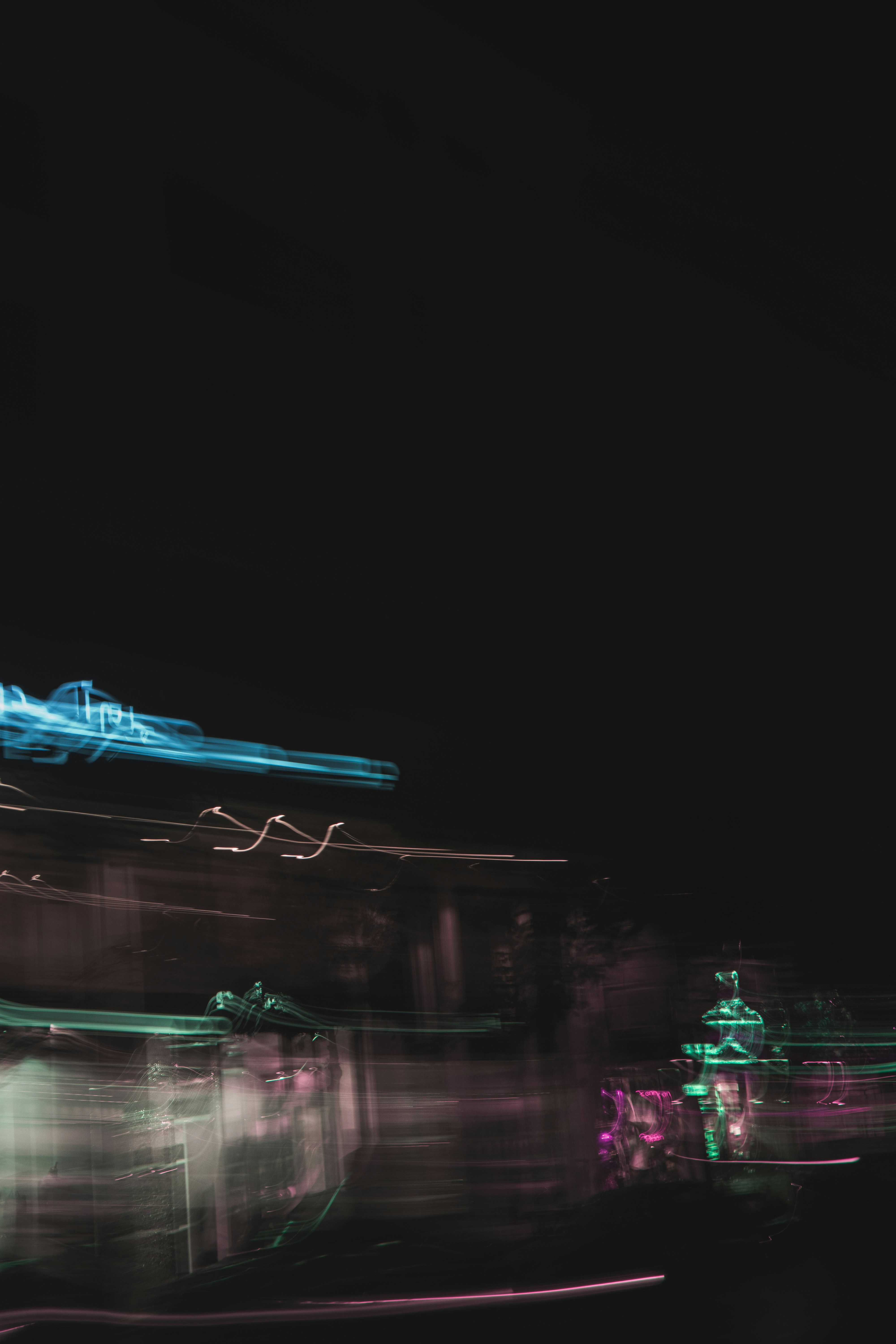 Neon Trails in the Night: A City Pulse in Motion Blur