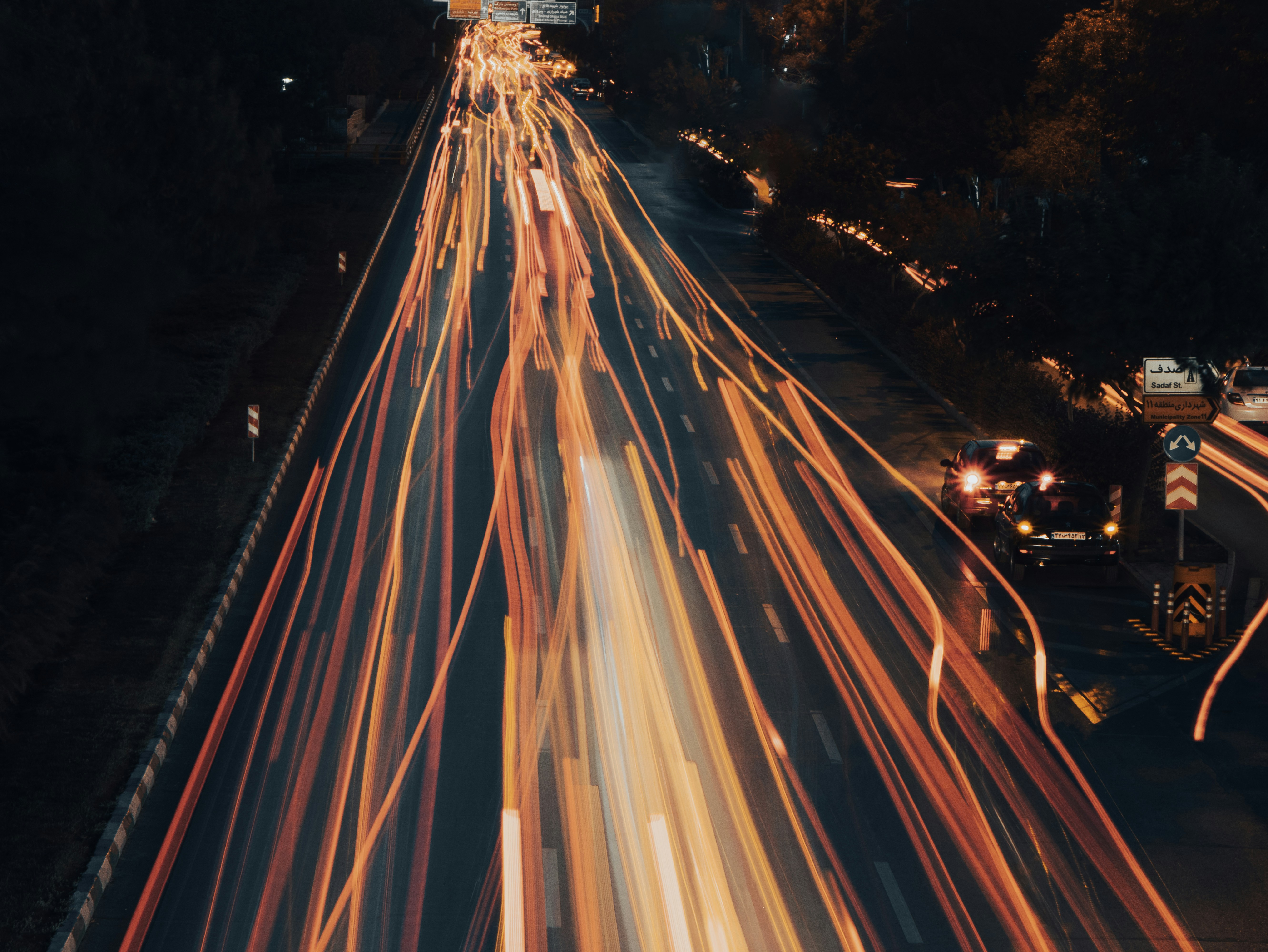 Taillights Converge: Night Street in Motion