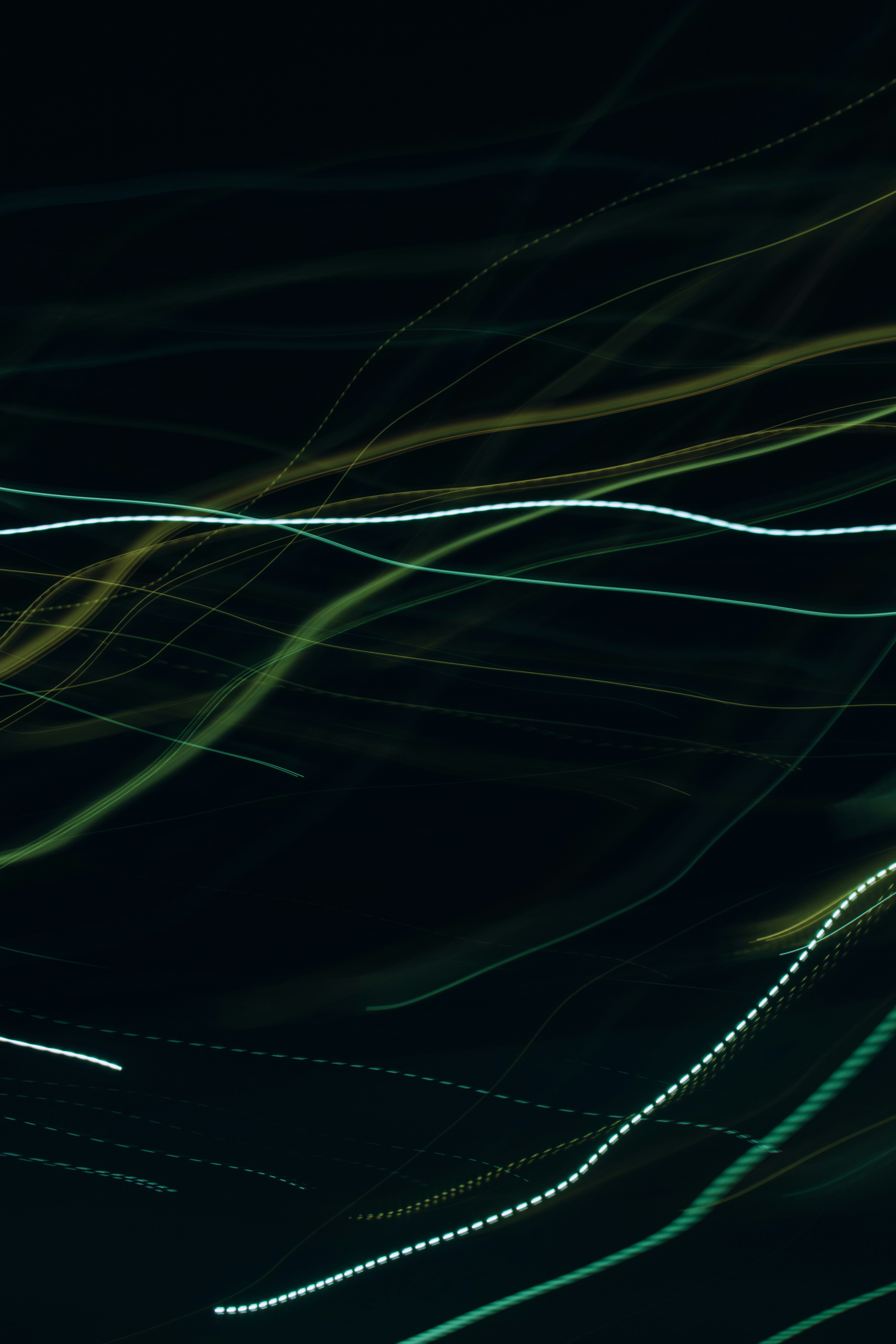 Neon Trails Over Dark Ocean