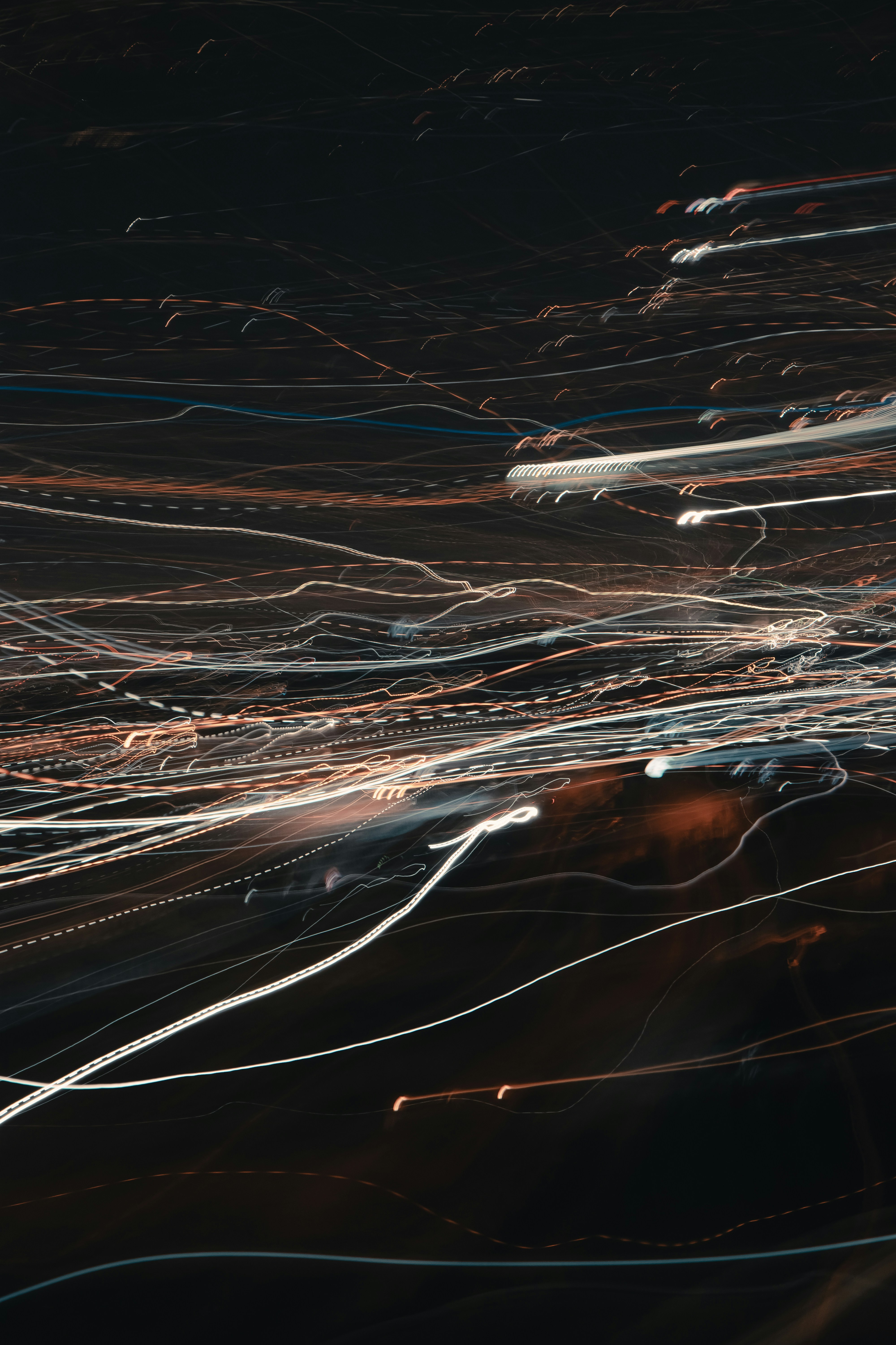 Night Traffic Trails: Neon Currents Across a Cityscape