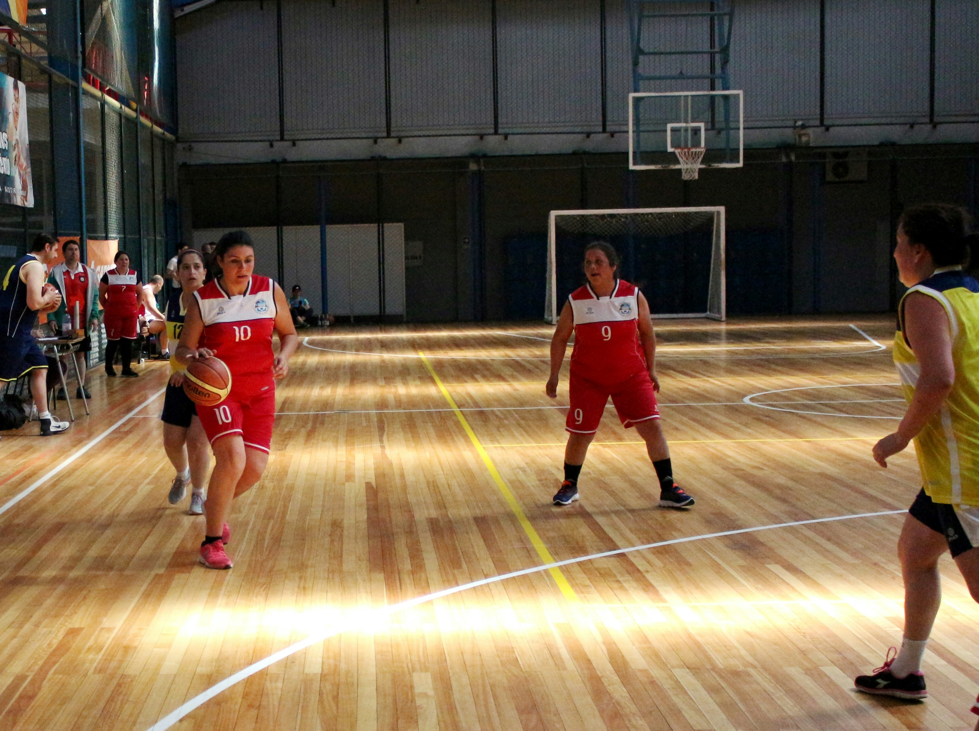 Dribbling Play in a Youth Basketball Gym