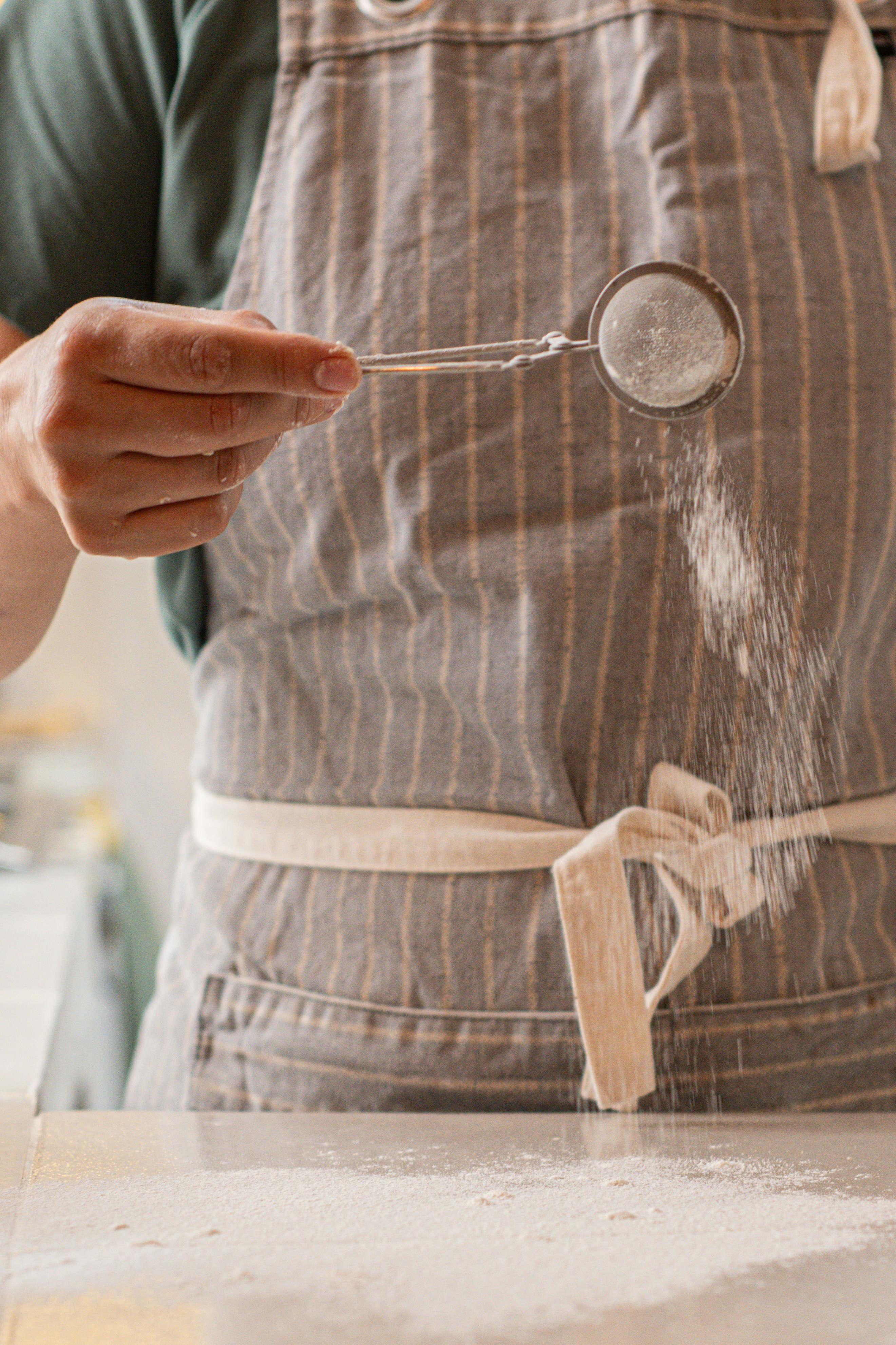 Dusting Sugar: A Moment of Precision in a Home Kitchen