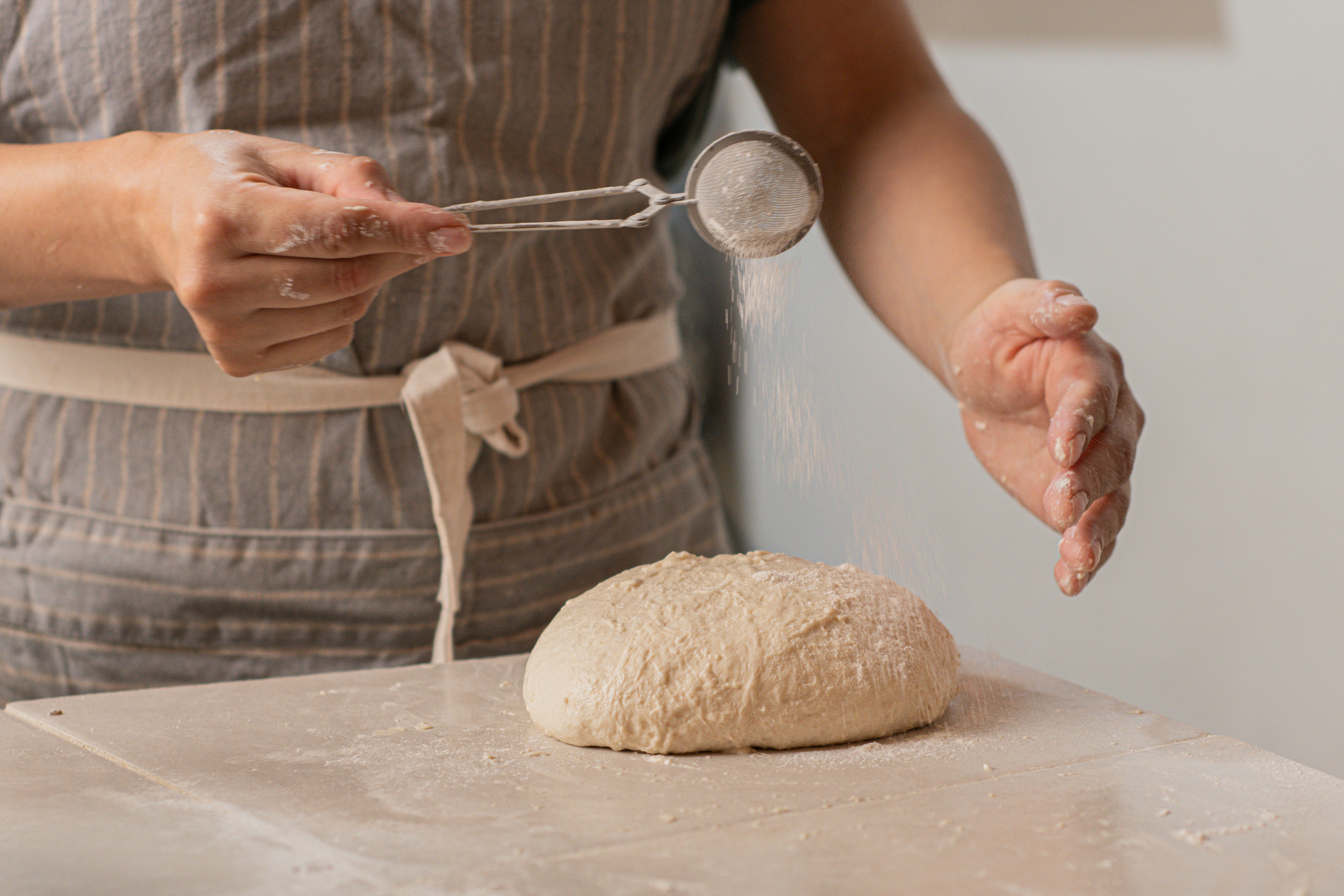 Dusting Dough: A Handful of Flour and Focused Craft in the Kitchen