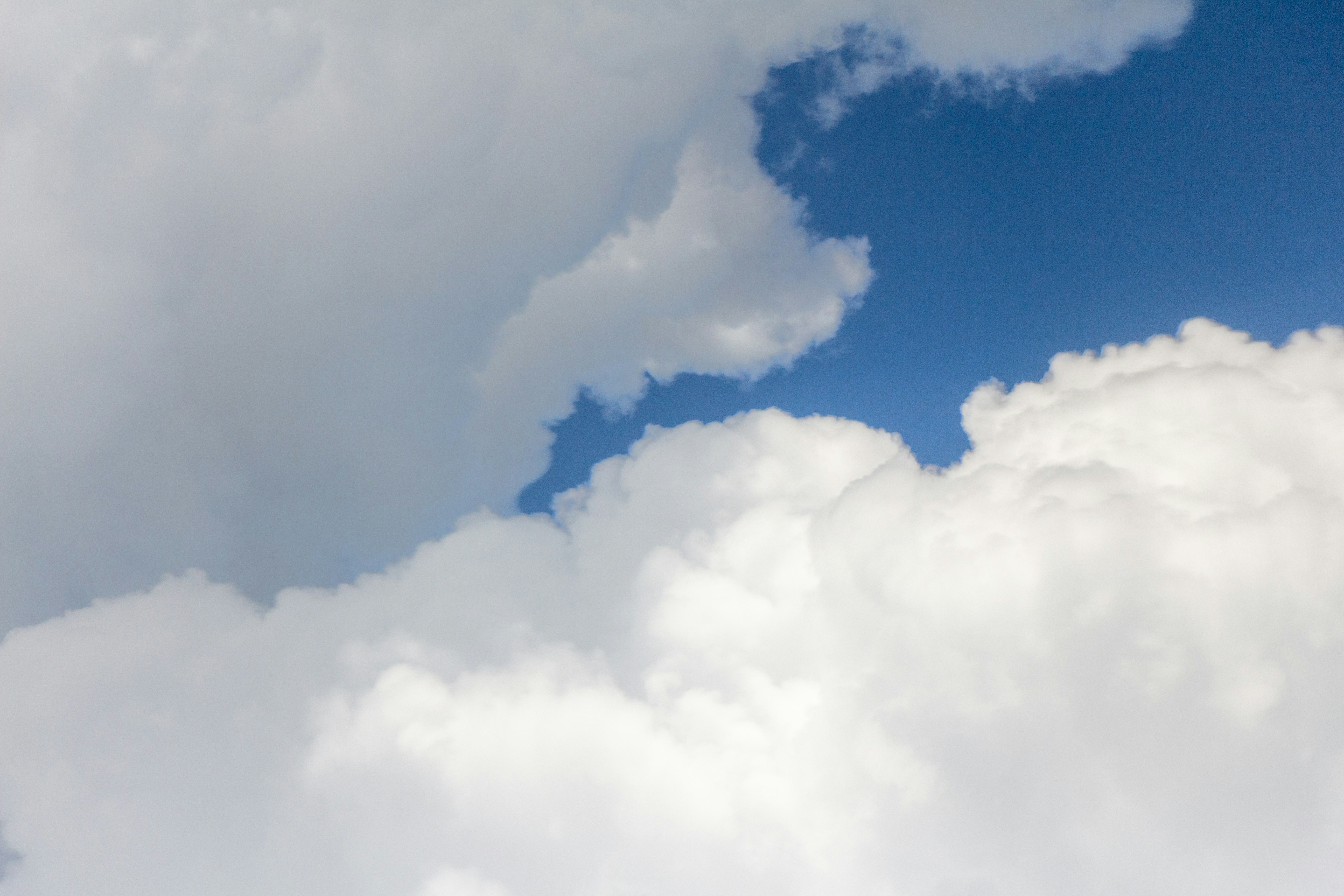 Open Sky with billowing clouds and a hint of blue