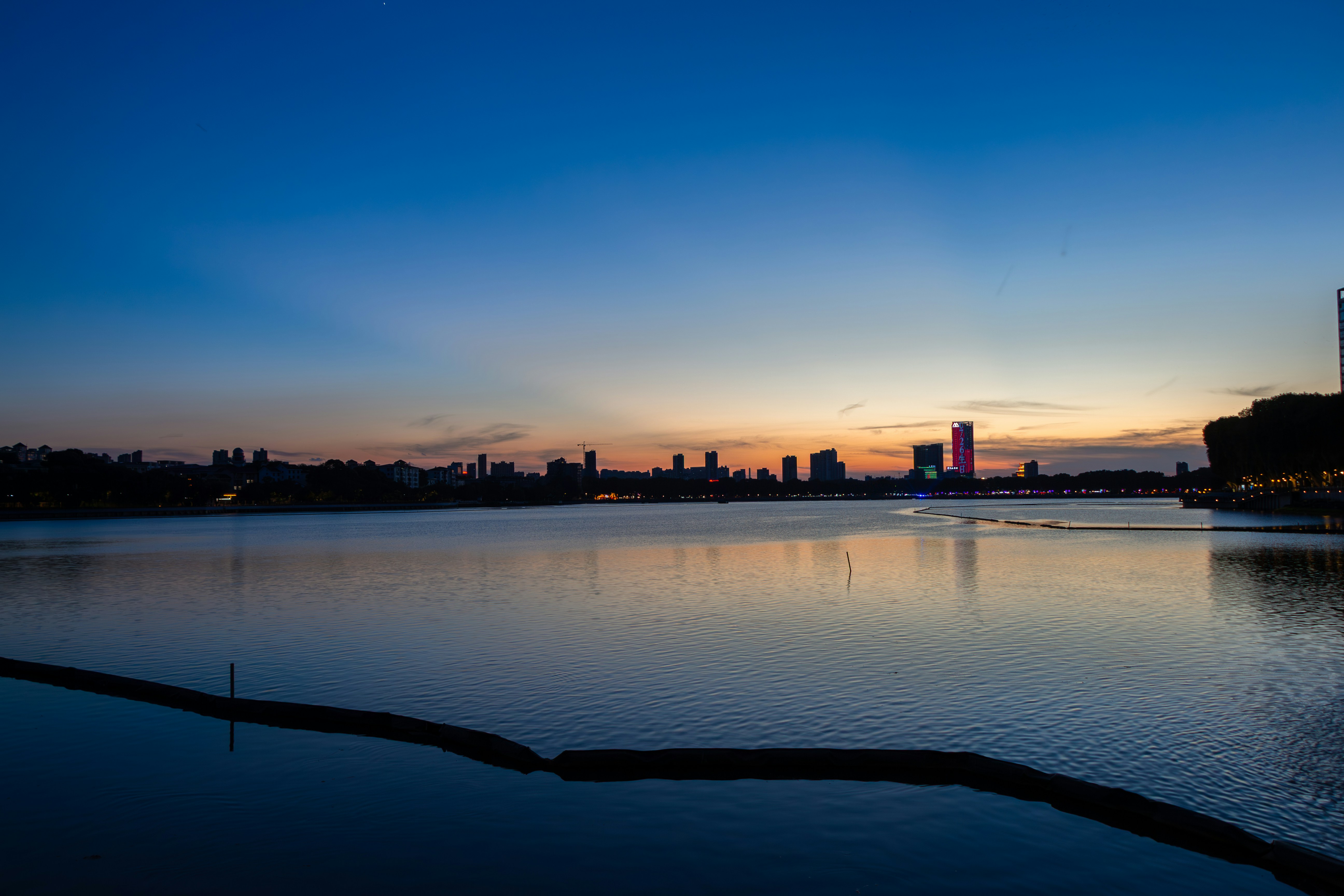Twilight Skyline Running Along a Silent Water