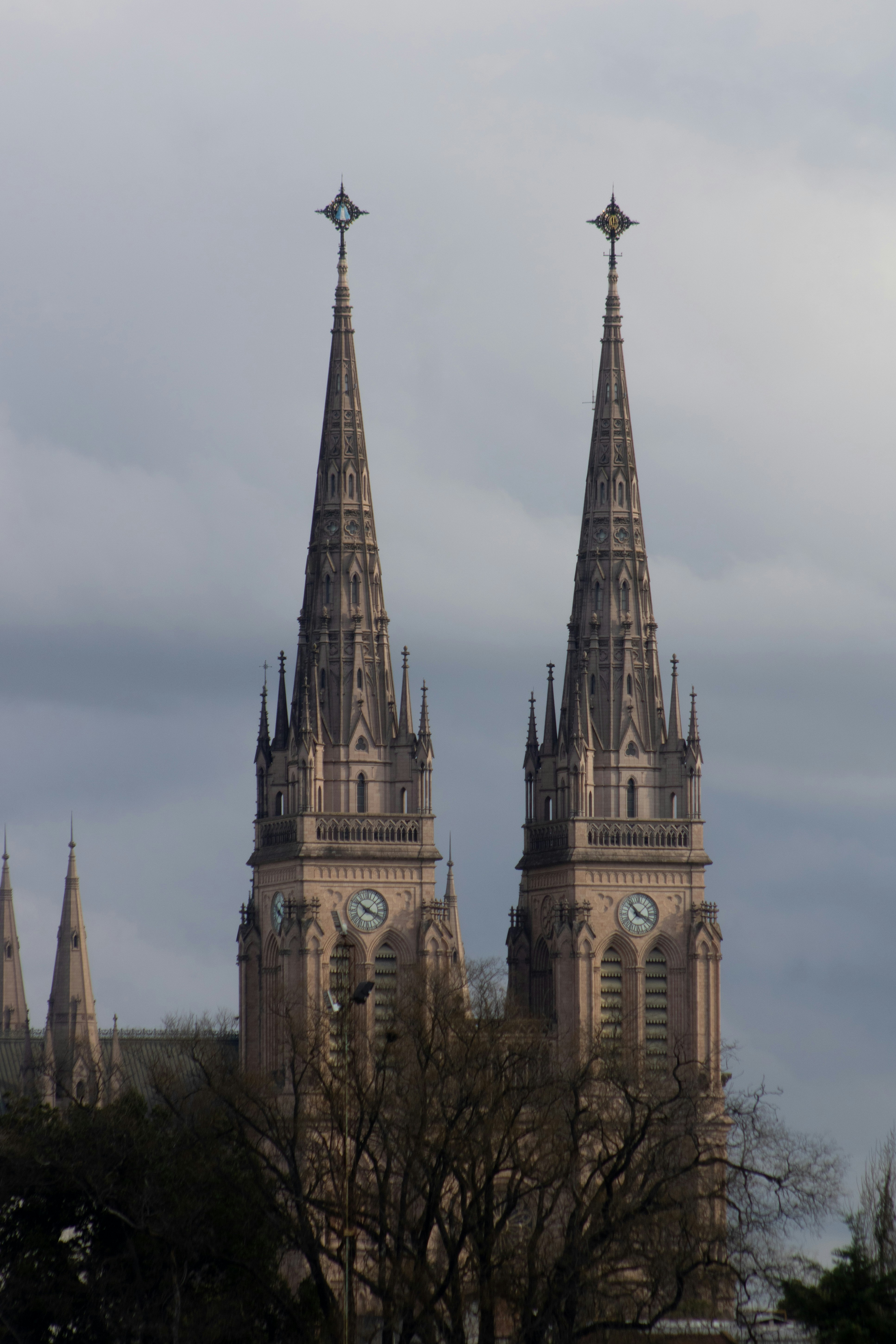 Twin Spires of Serenity Over Parked Shadows