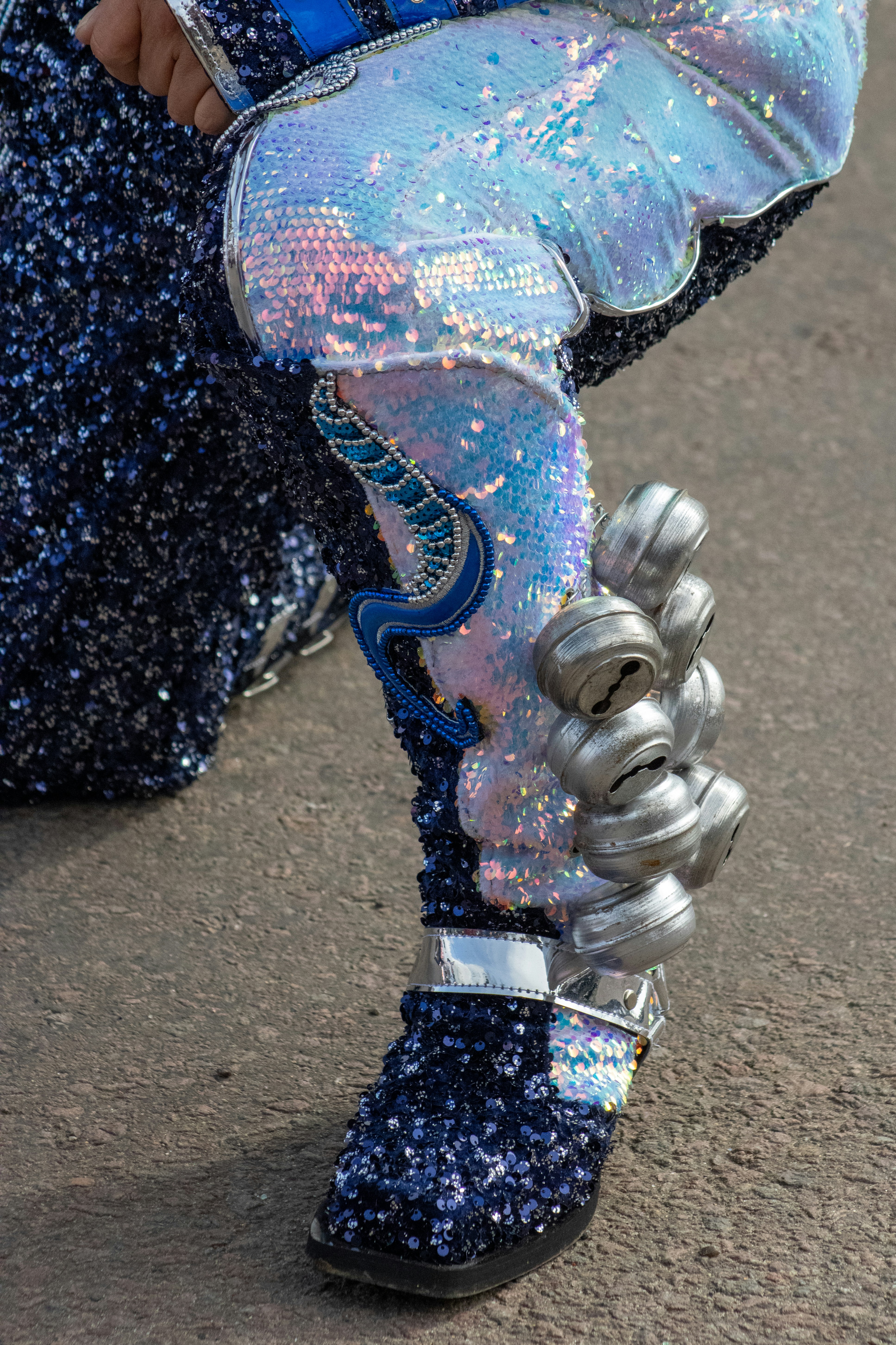 Glittering Leg Ornaments and Sparkling Boot: A Dance of Sequins