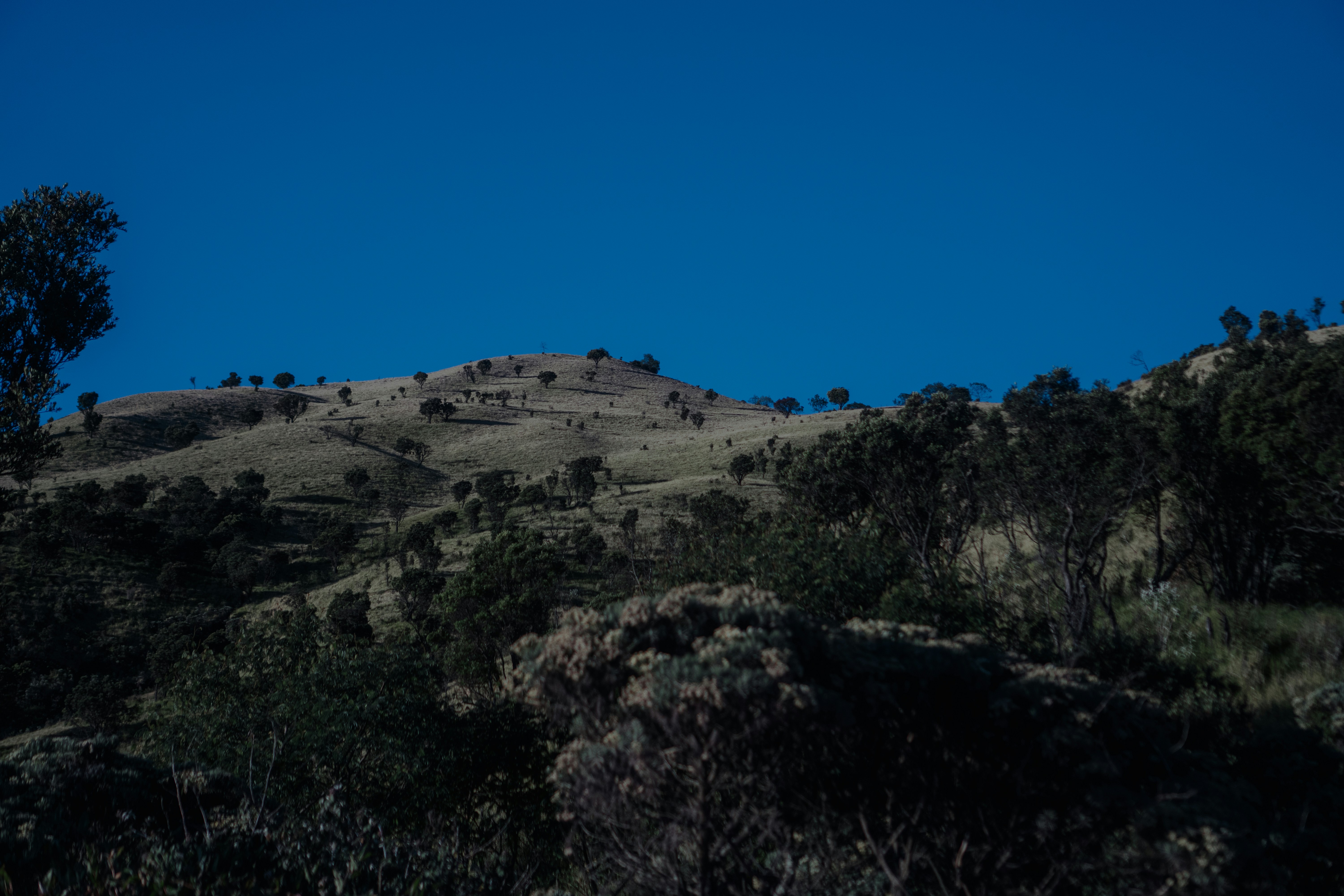 Hushed Hills Under a Pristine Blue Dome