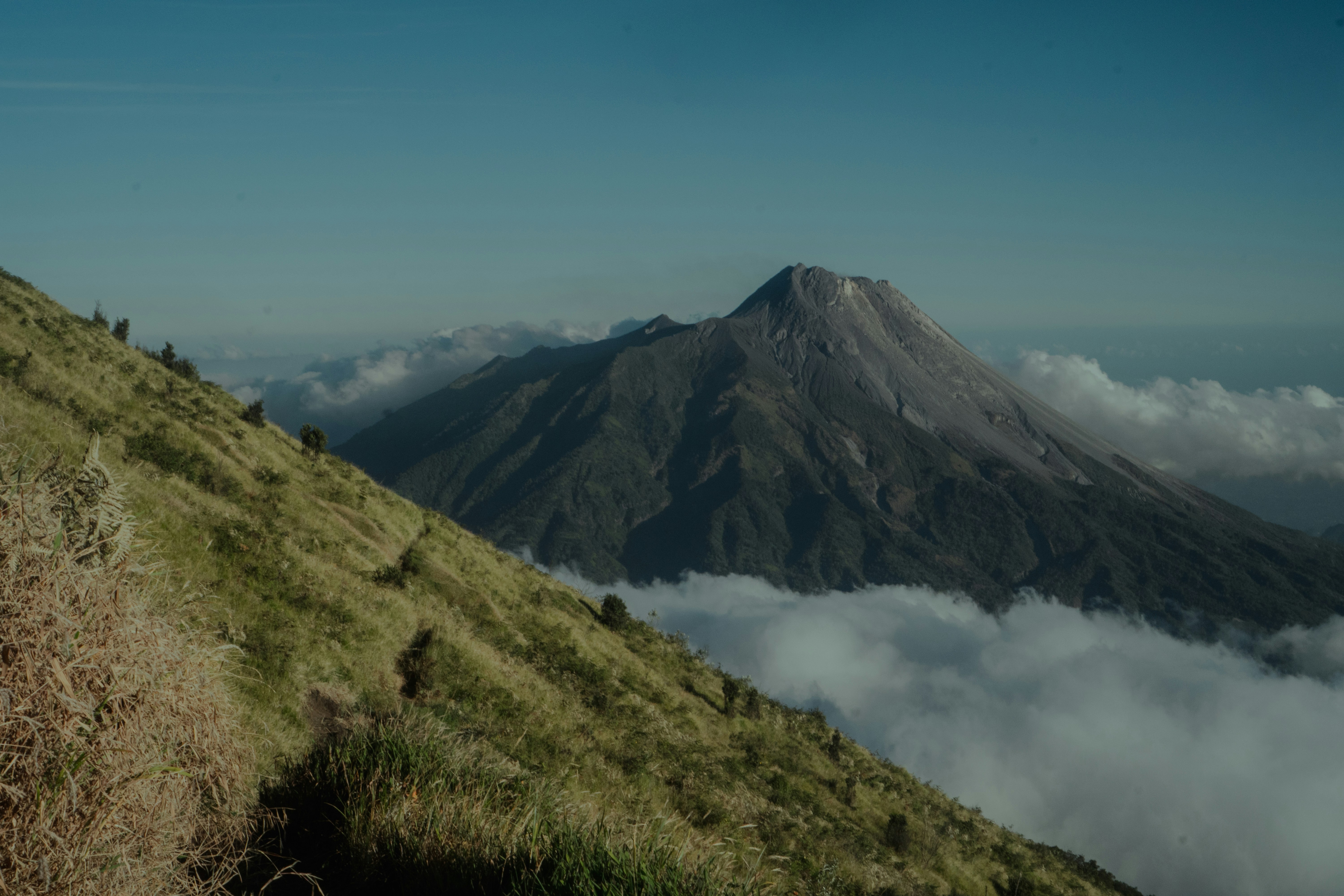 Peak Above the Clouds: A Ridge Walk Toward the Lone Summit