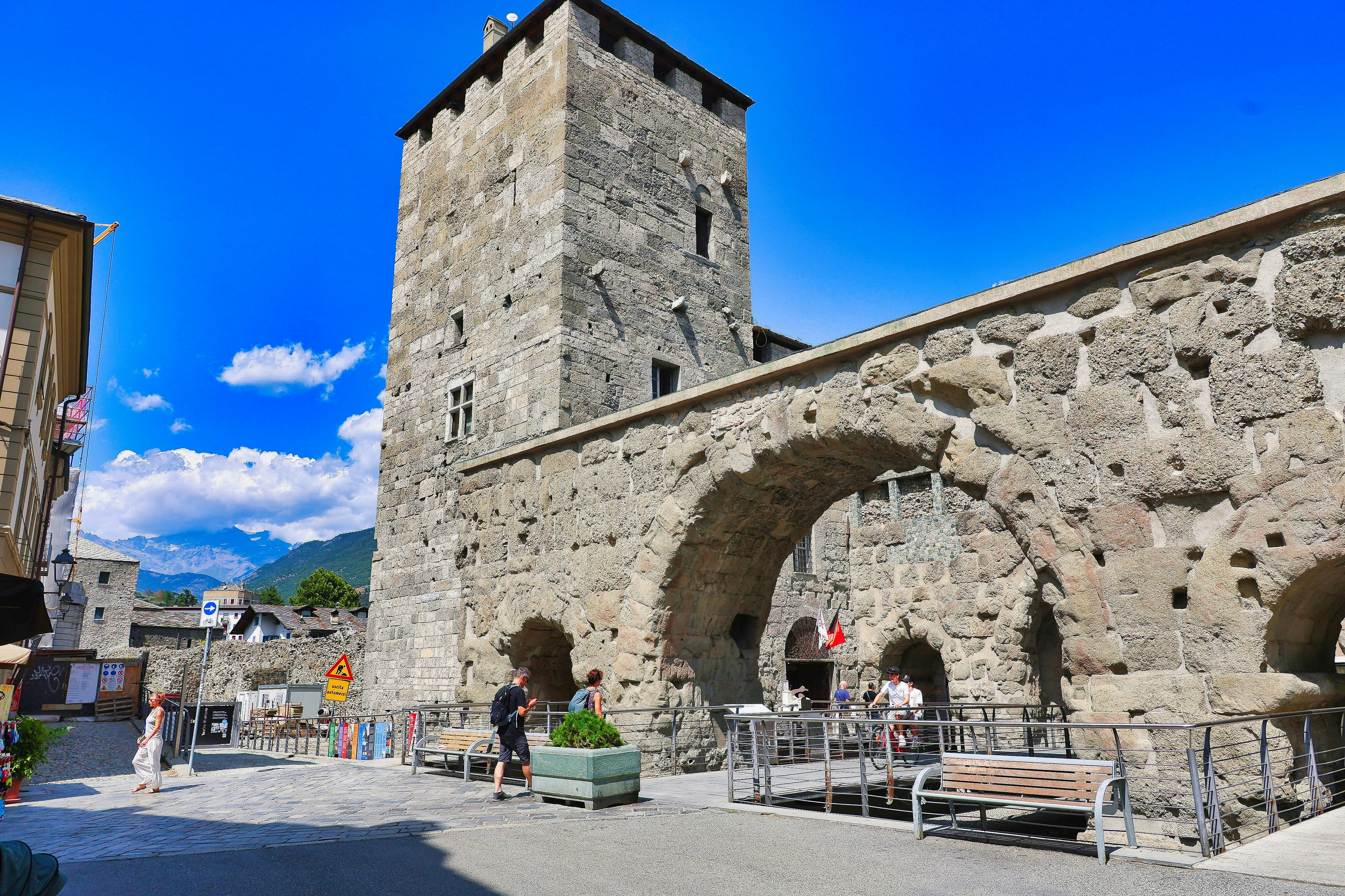 Medieval Gatehouse Under a Pristine Alpine Sky