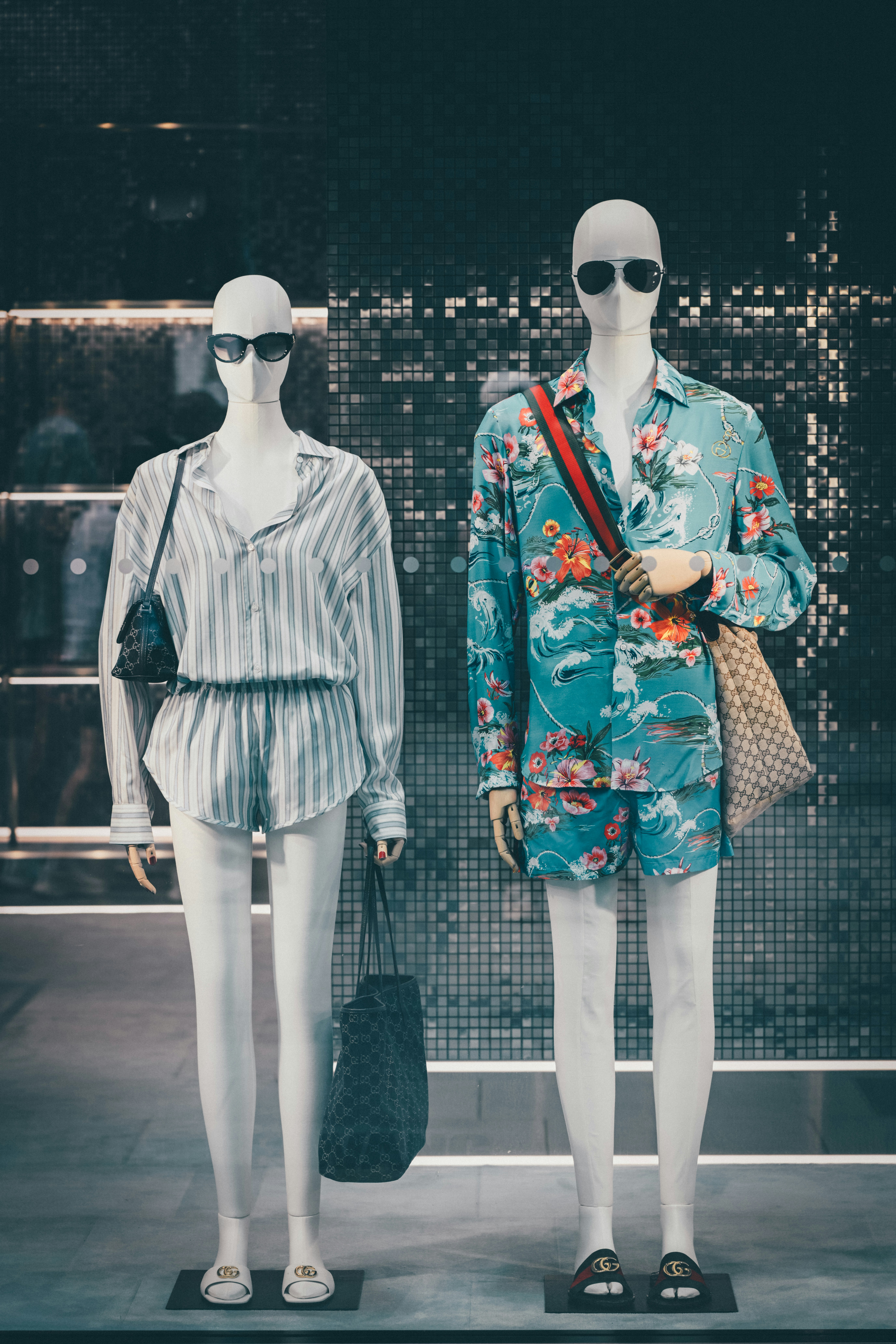 Twin Muses in a Glassy Street: Striped Elegance and Floral Escape