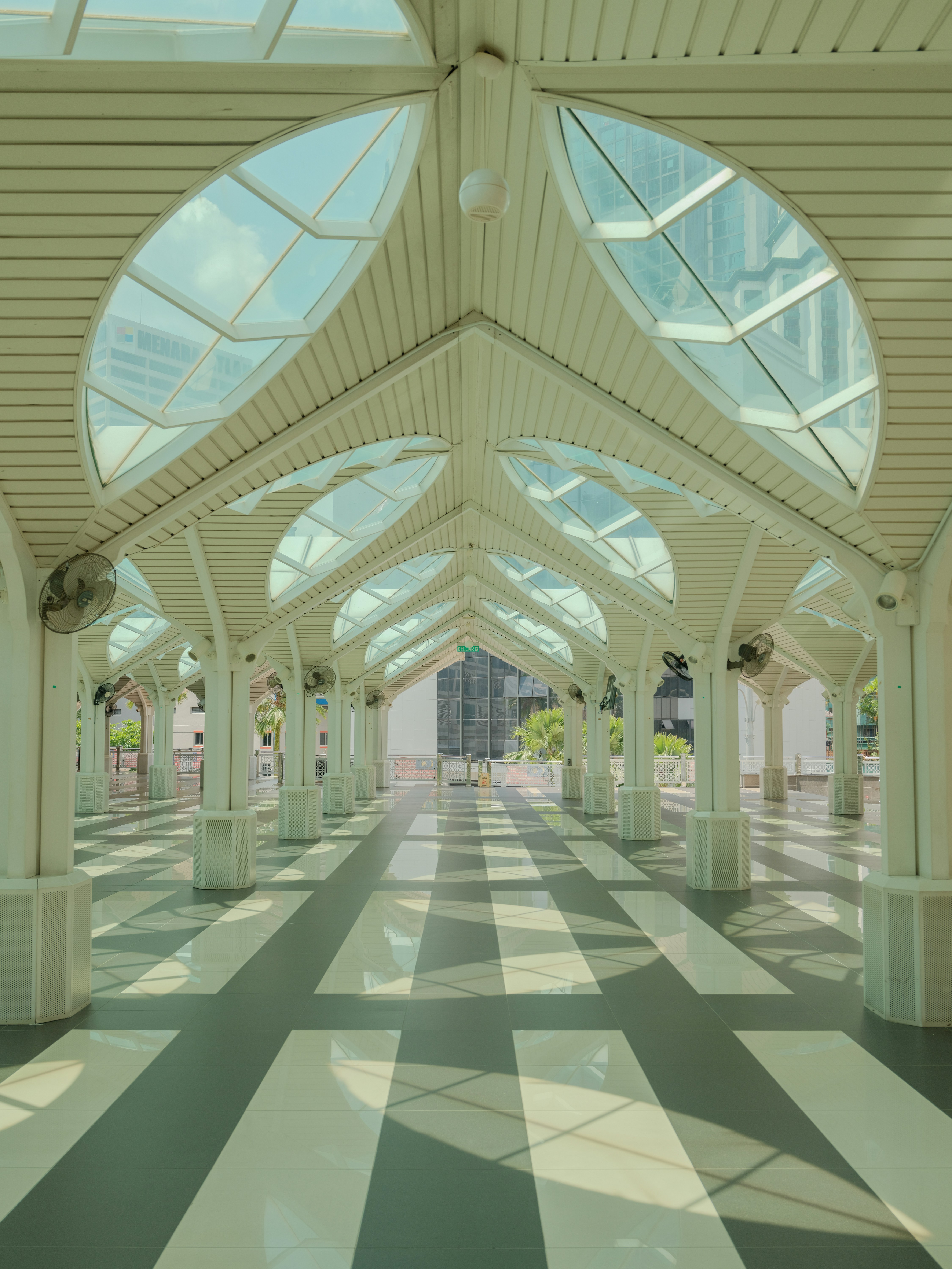 Arched Glassway: Infinite Sunlit Lattice