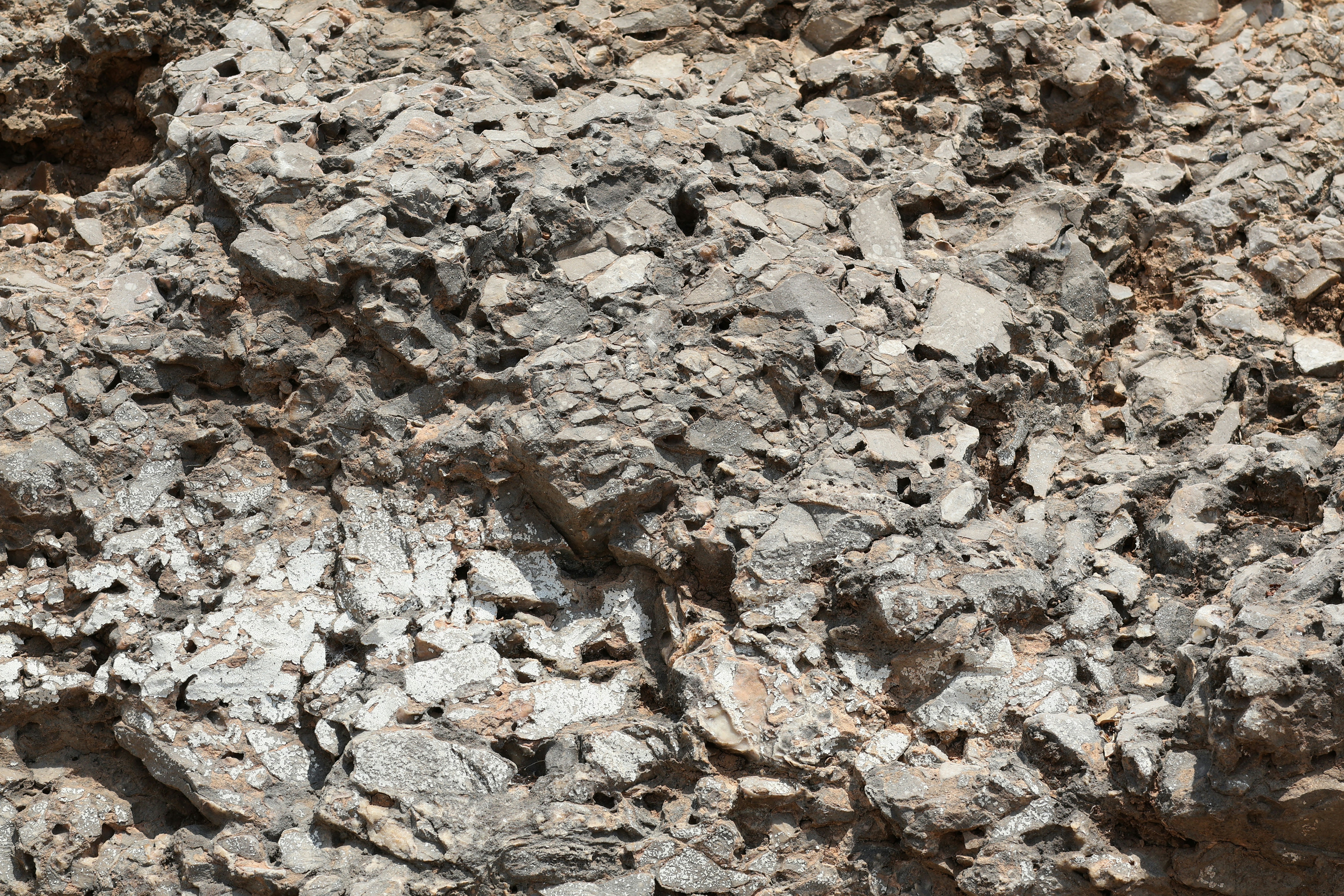 Rugged Limestone Texture Under Harsh Light