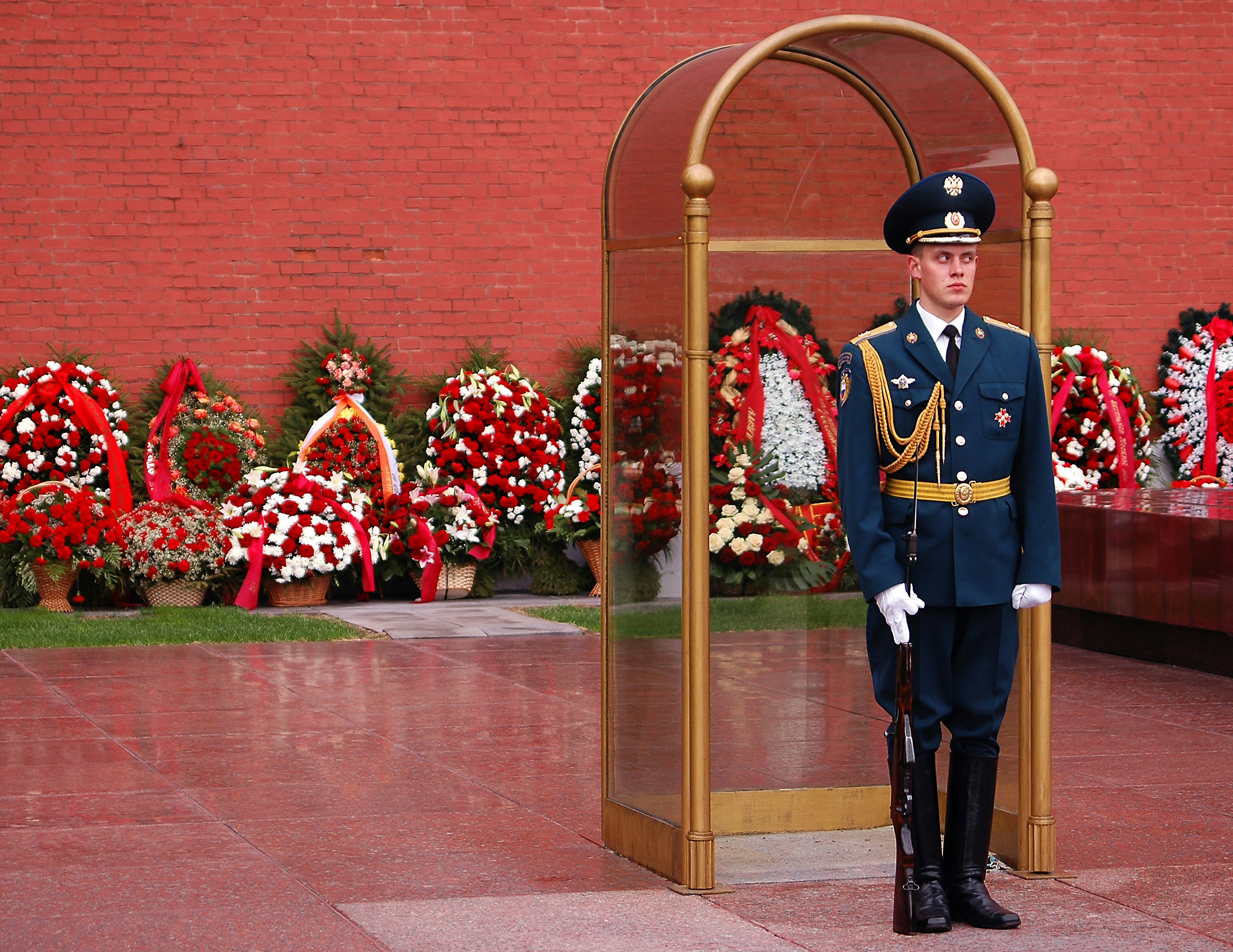 Sentinel at the Gate: A Guard in Formal Blue at the Memorial Arch