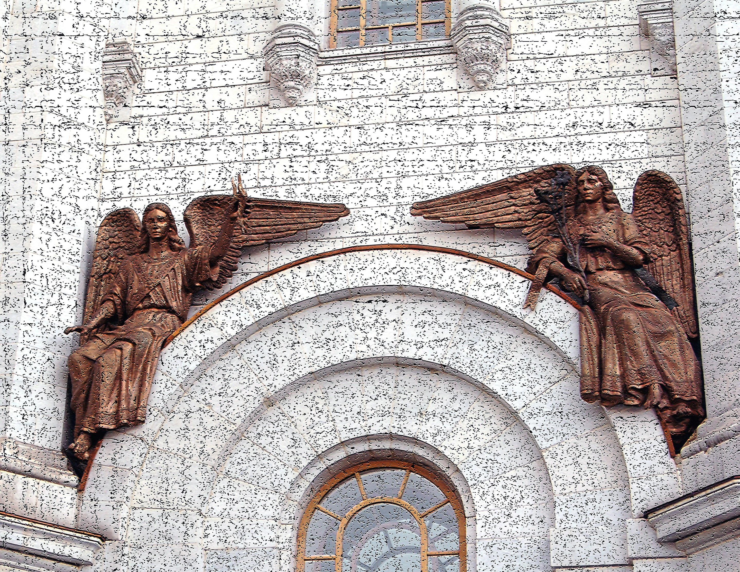 Stone Guardians: Winged Sentries Above the Arch