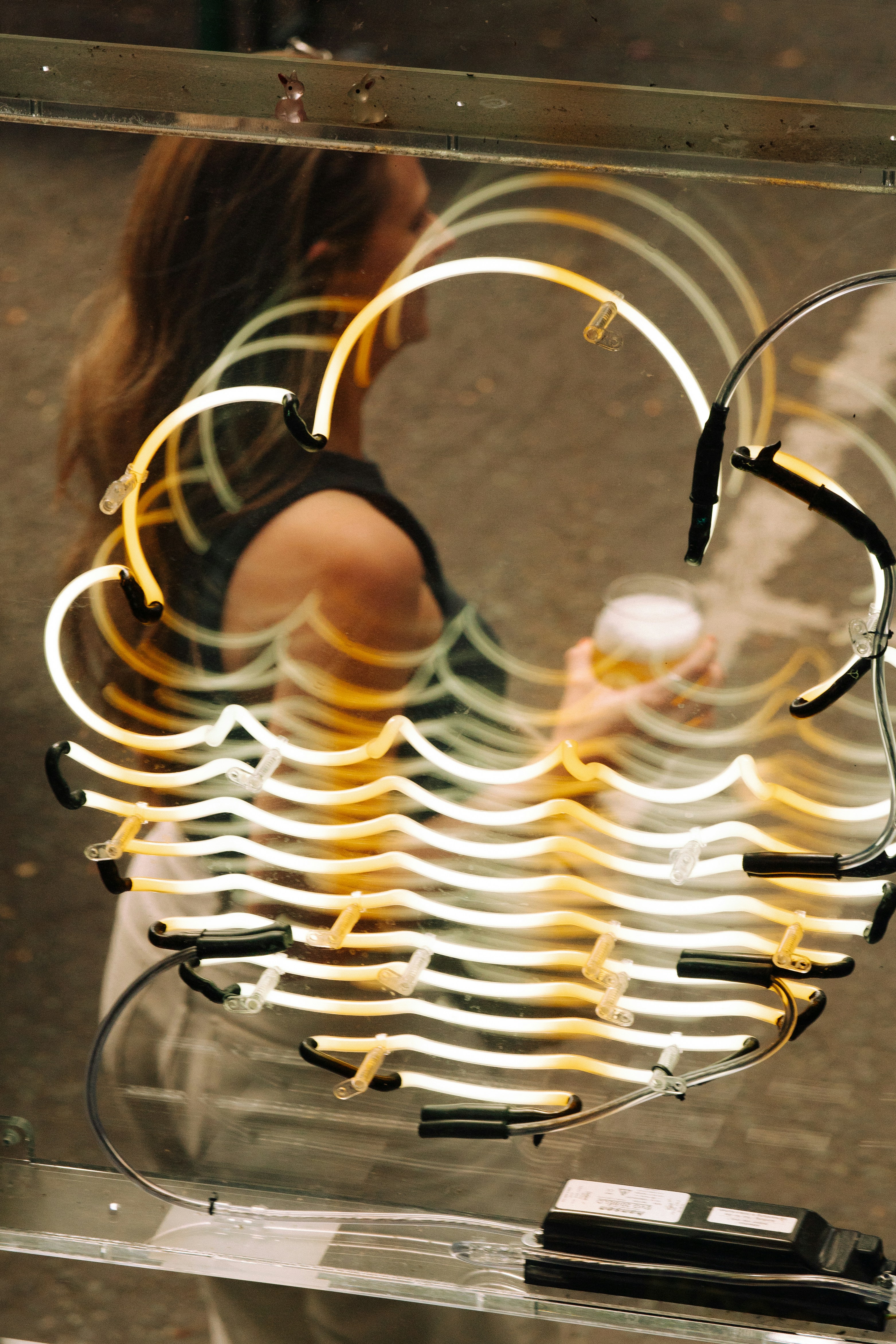 Neon Reflections: A Portrait in Light and Glass