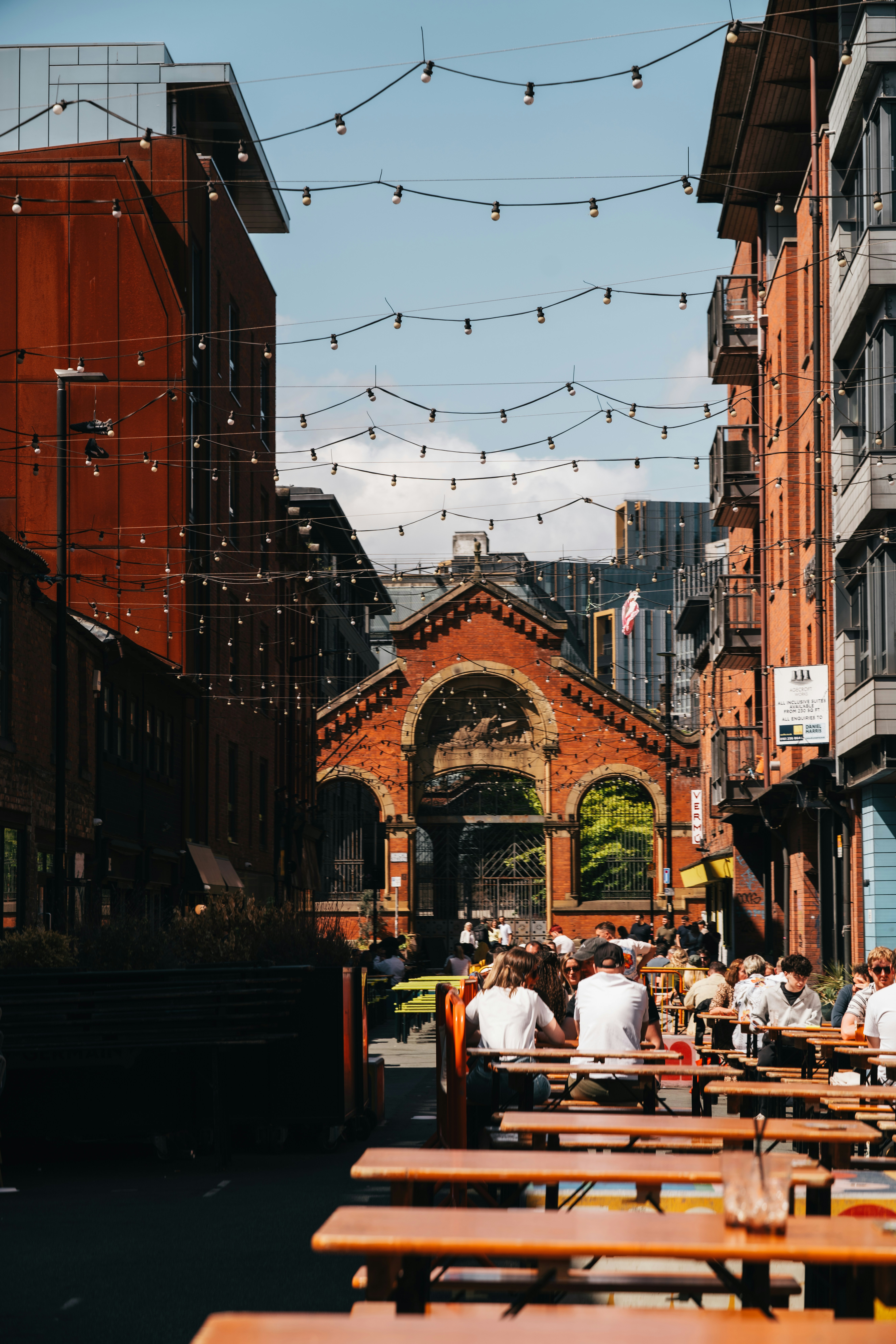 Brick Archway Bistro Beneath String Lights