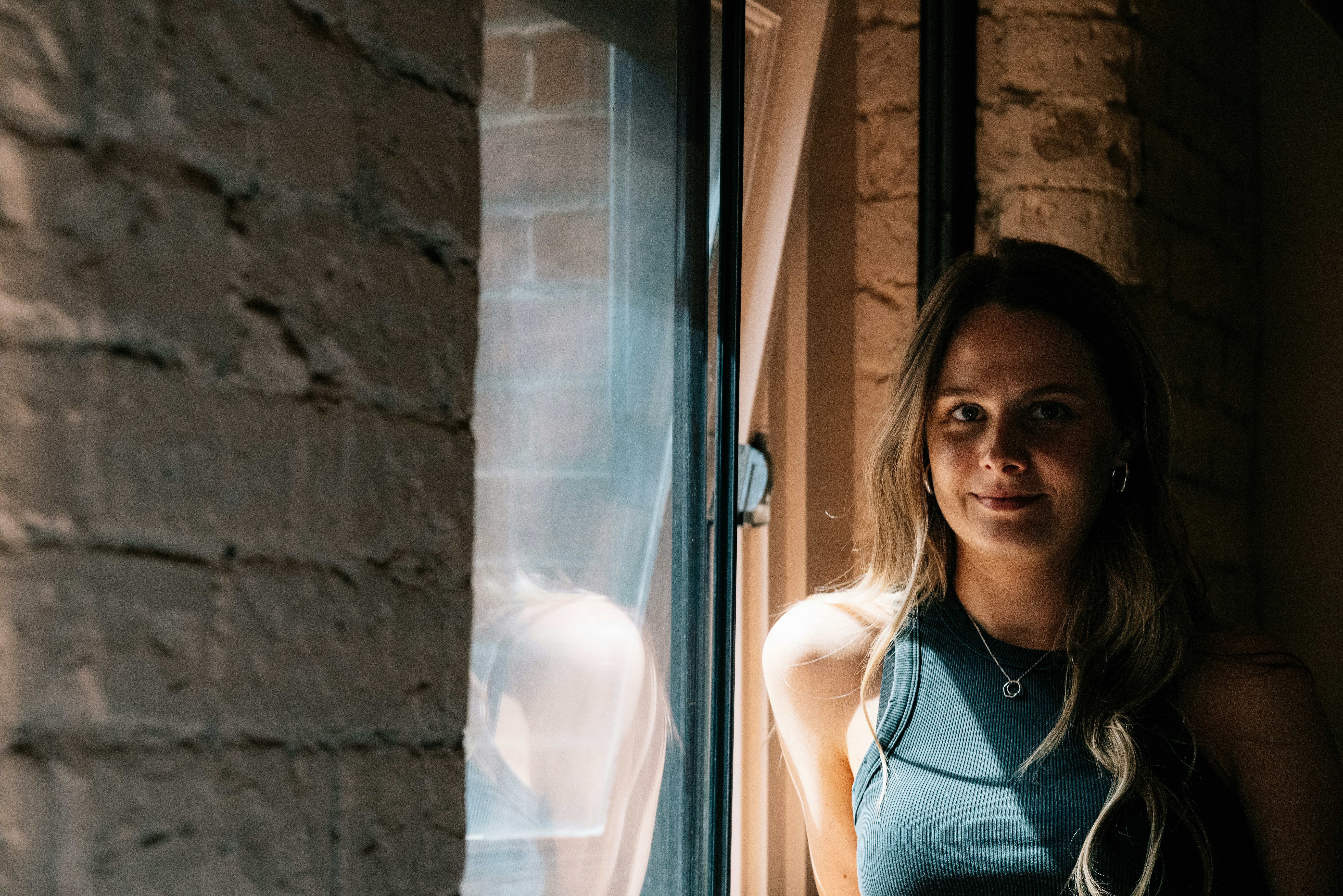 Half-light, Half-Window: A Portrait in Quiet Urban Glow