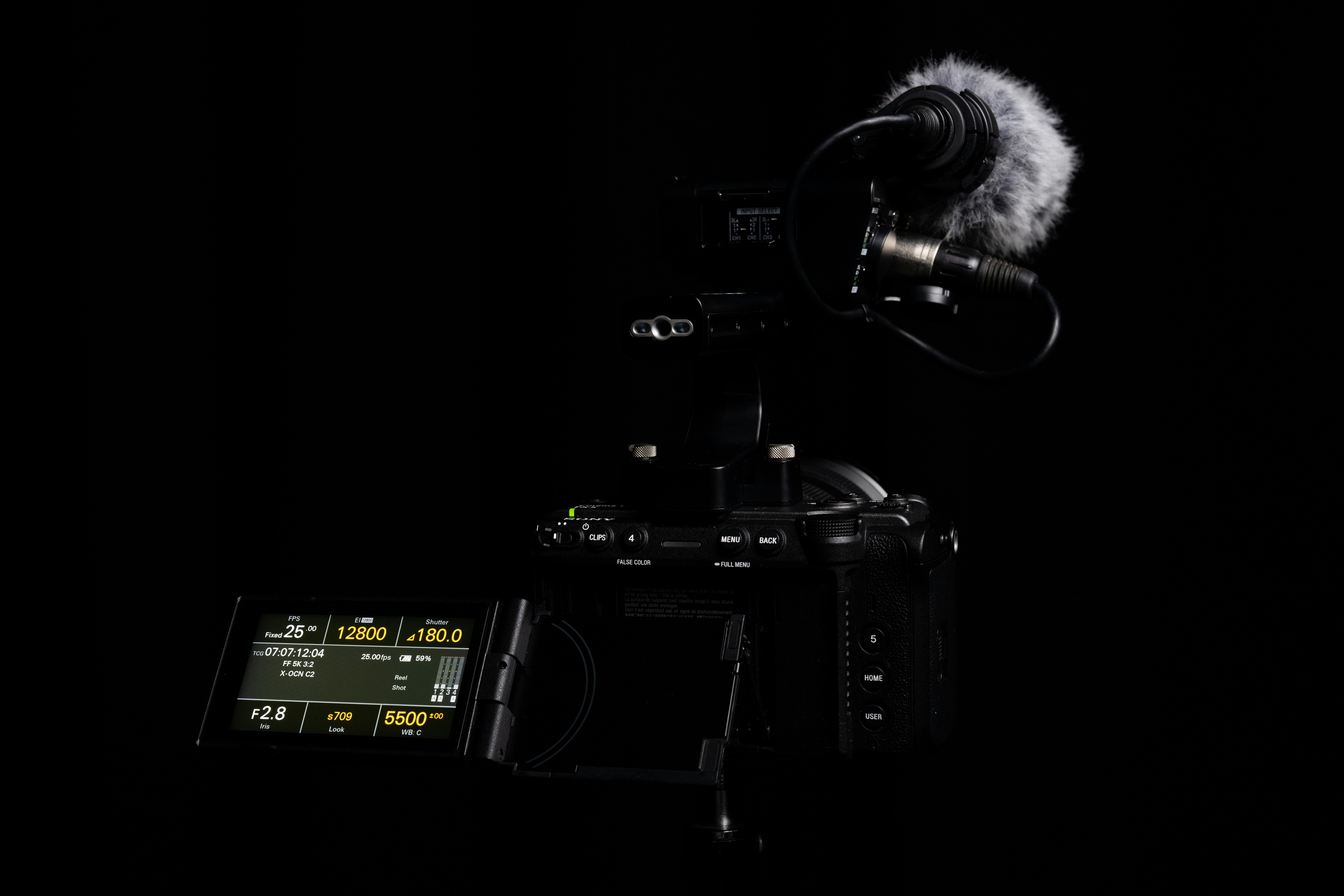 Rigged Silence: A Dark Studio Portrait of a Professional Cine Rig
