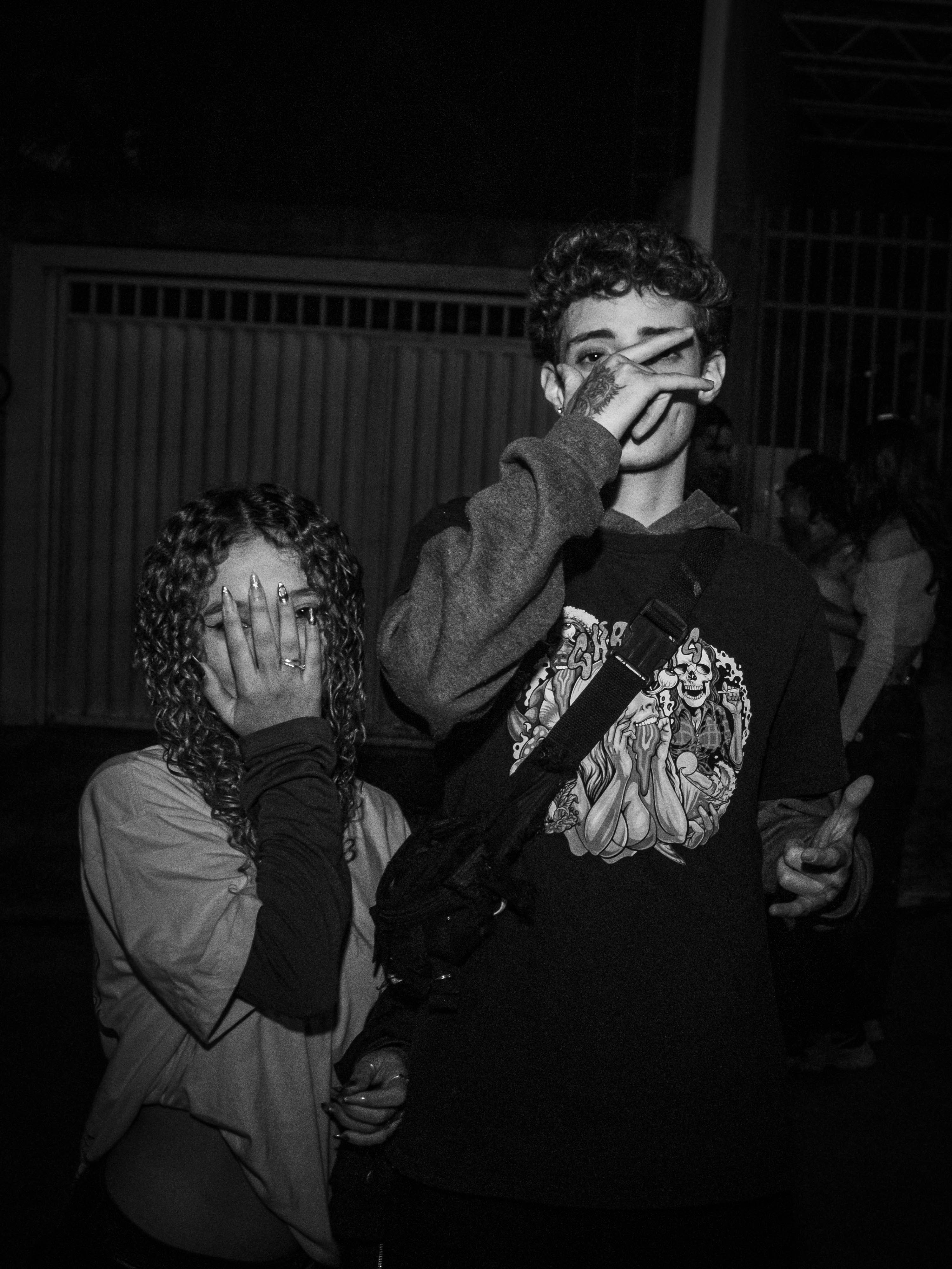 Two Night Friends in Shadowed Streetlight