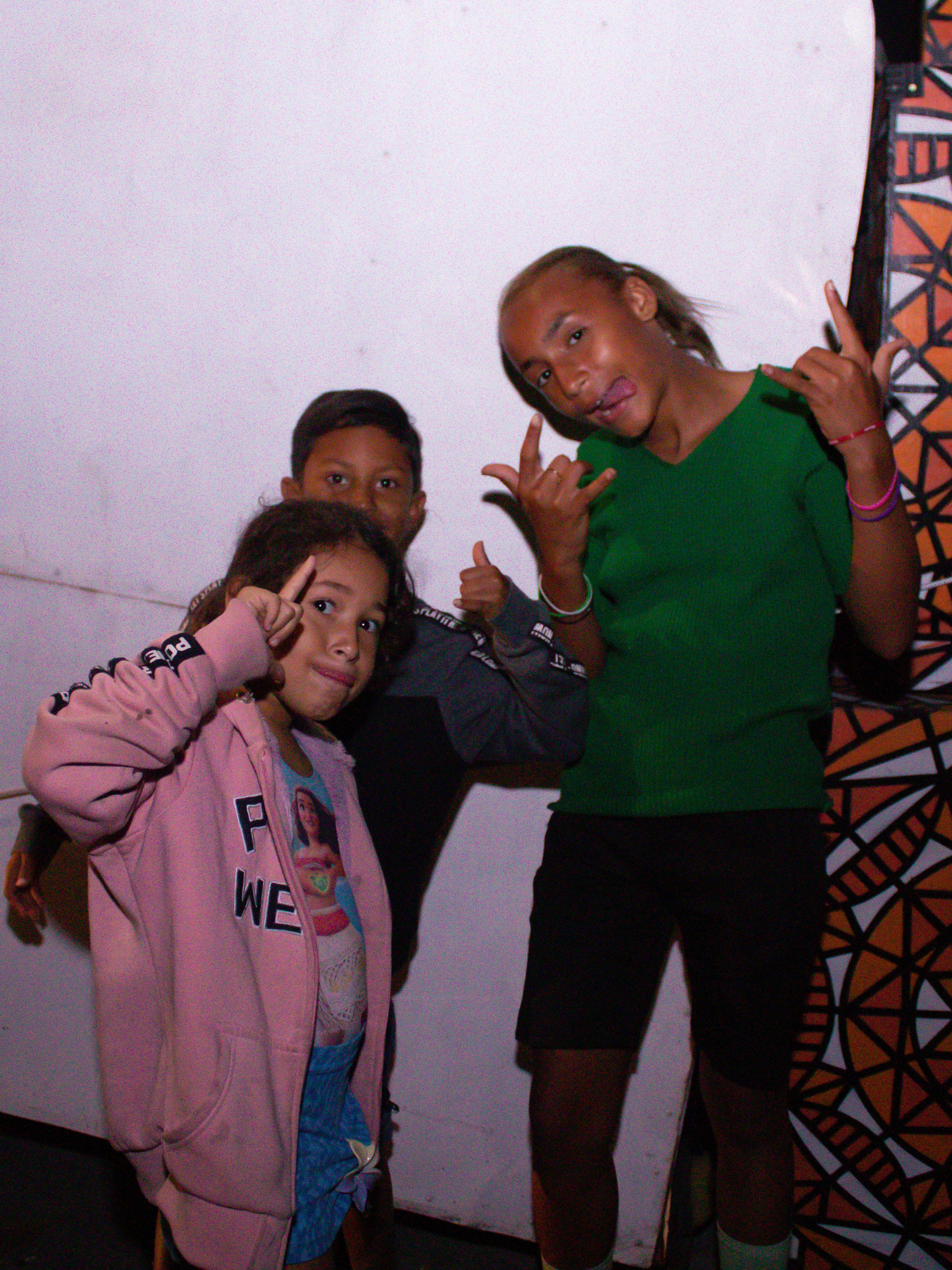 Live Energy: Kids and a Teen Pose for the Weekend Photo