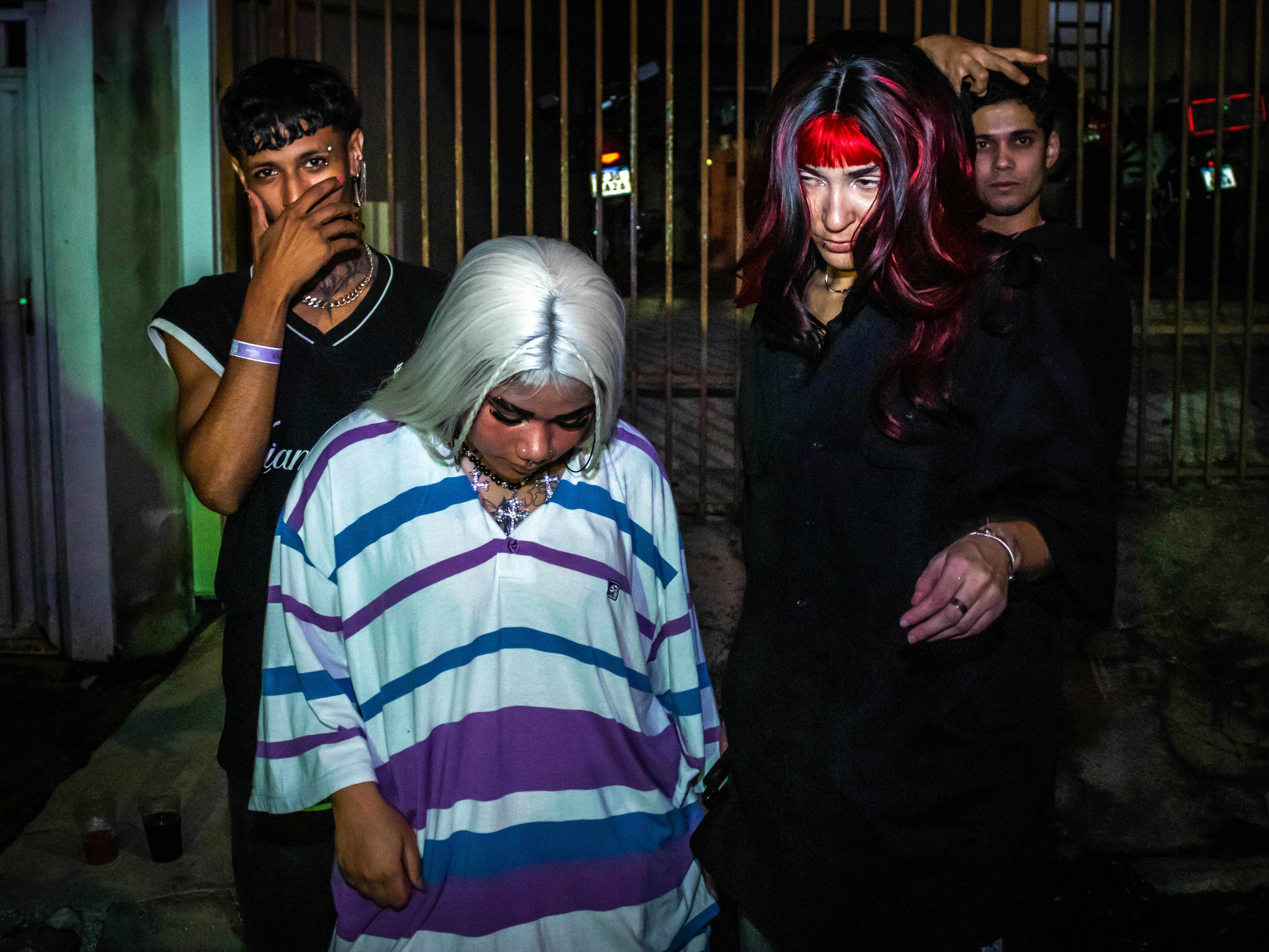 Midnight Aftermath: Club Night Figures in Shadowed Gaze