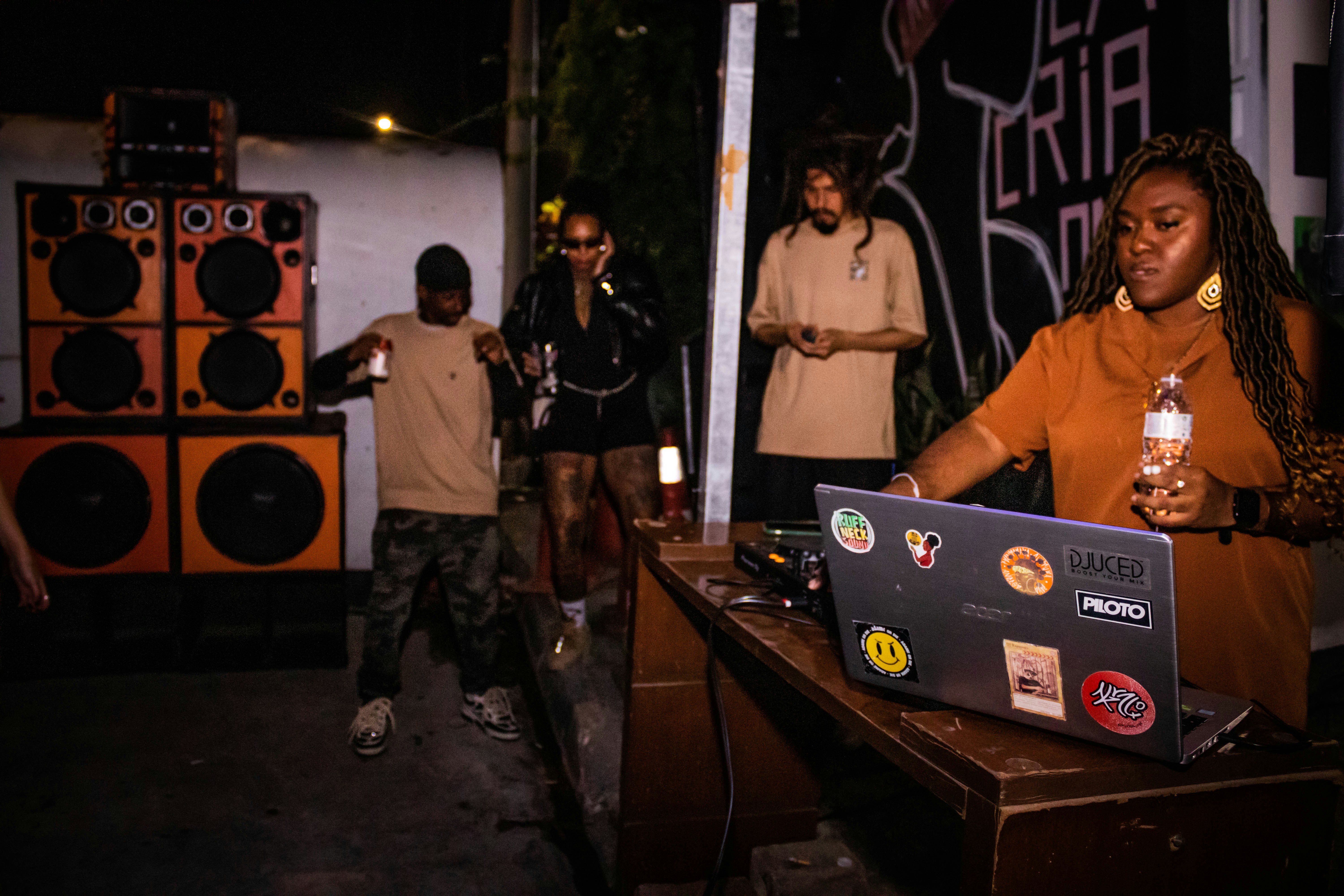 DJ at the Turntable: Night Vibes in the Studio Yard