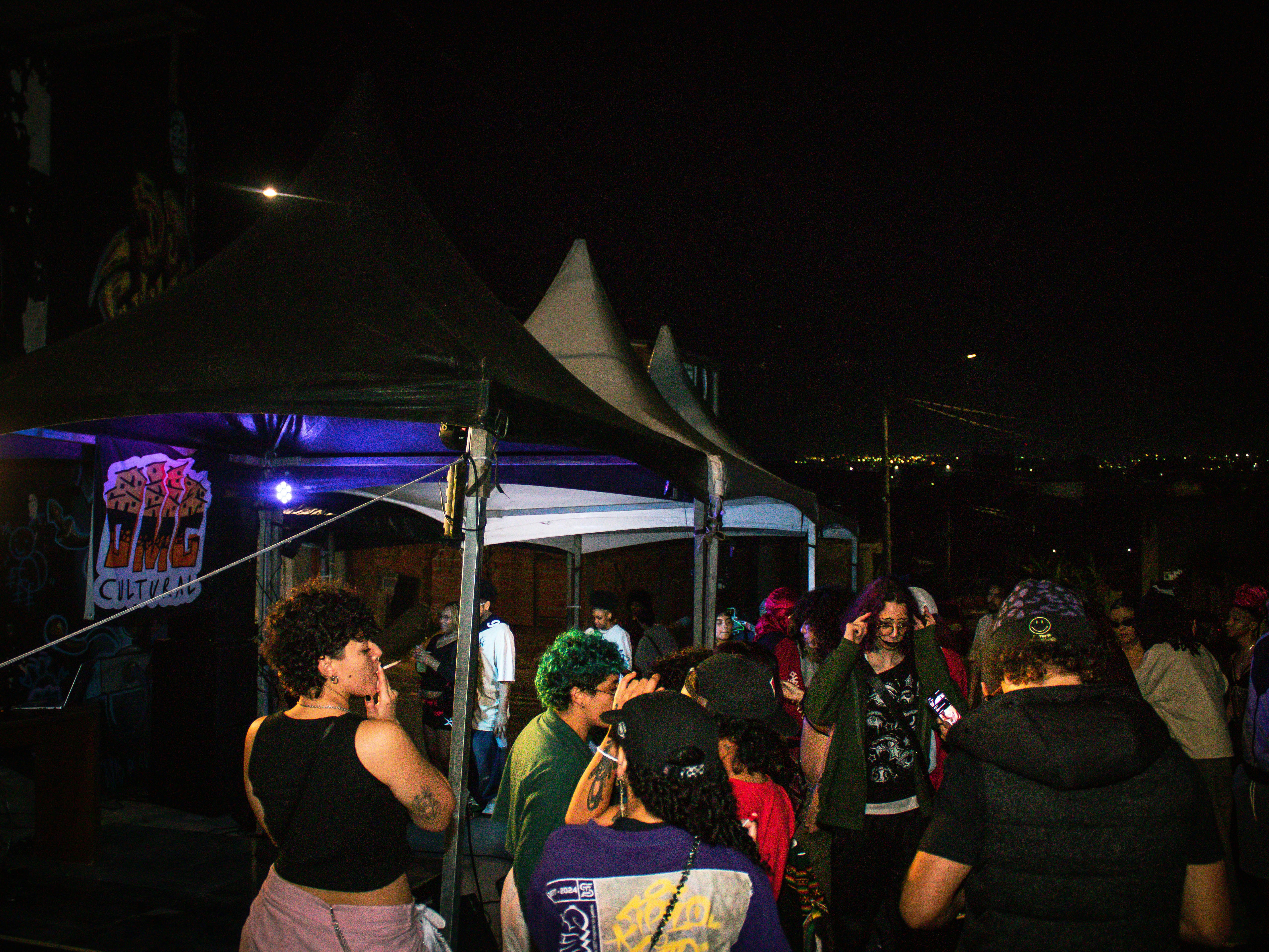 Midnight Street Party: Faces, Lights, and a Tented Stage