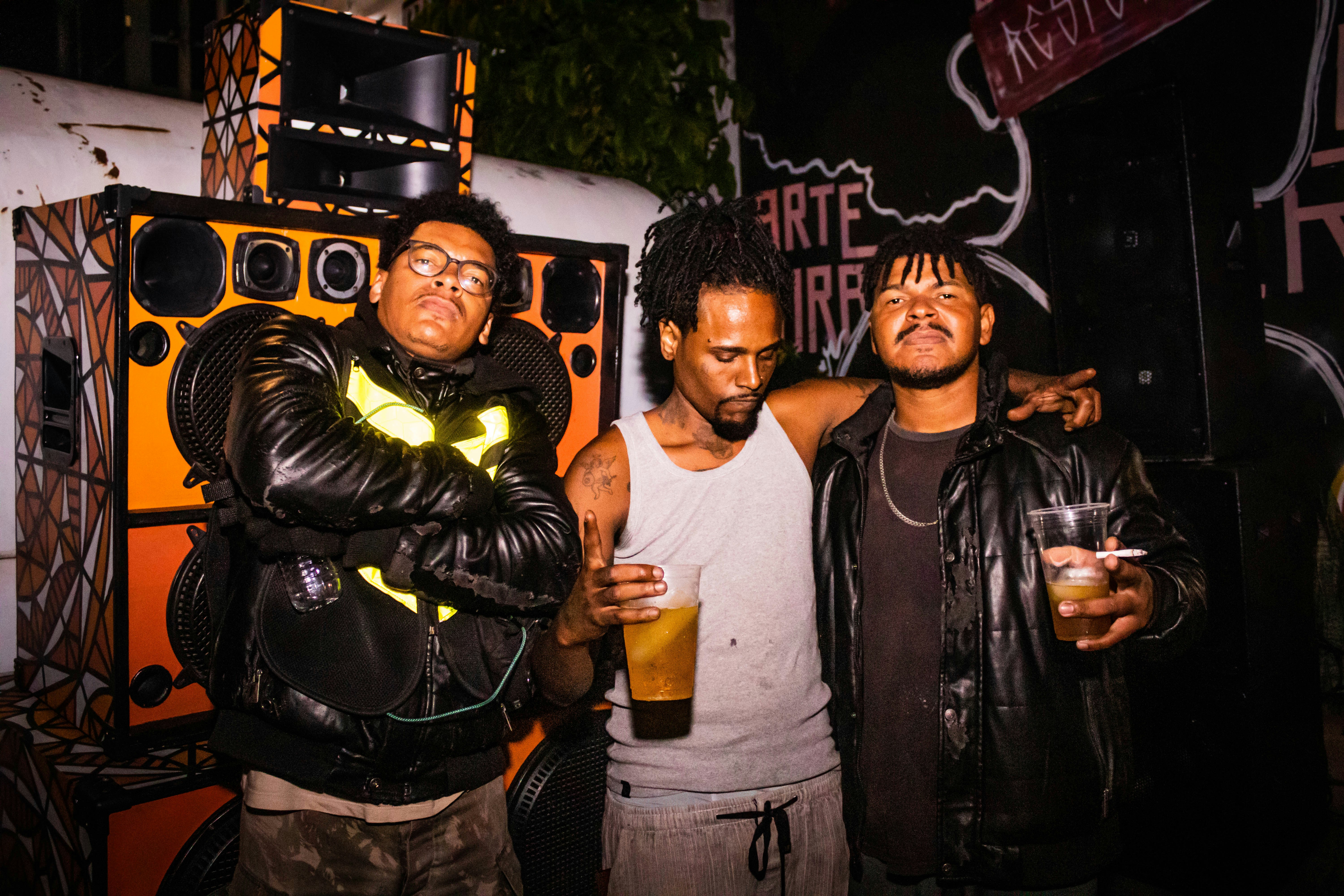 Midnight Beats: Trio of Confidence in a Neon Carved Studio