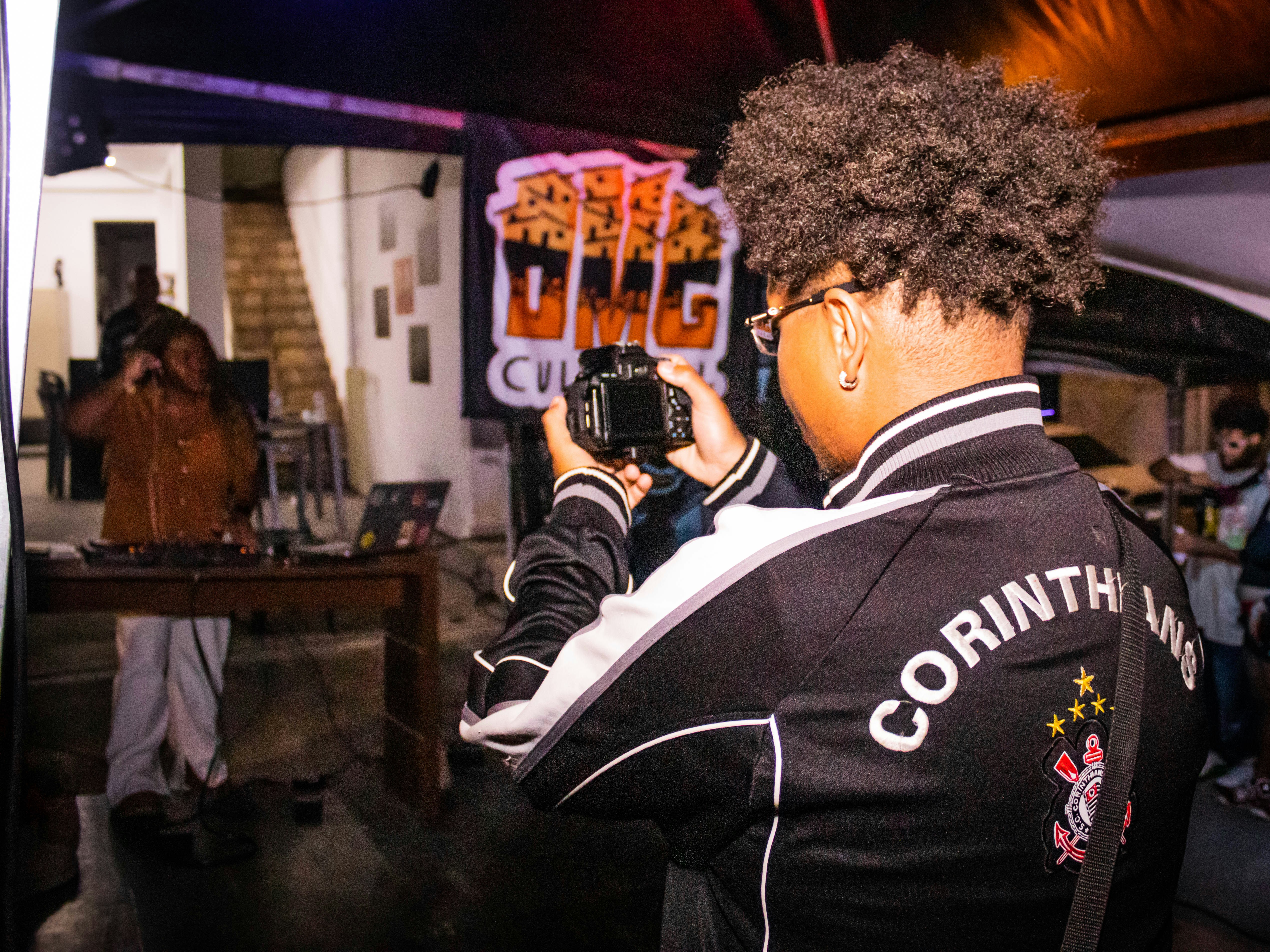 Behind the Lens: Focus on the Creator in a Nighttime Jam Session