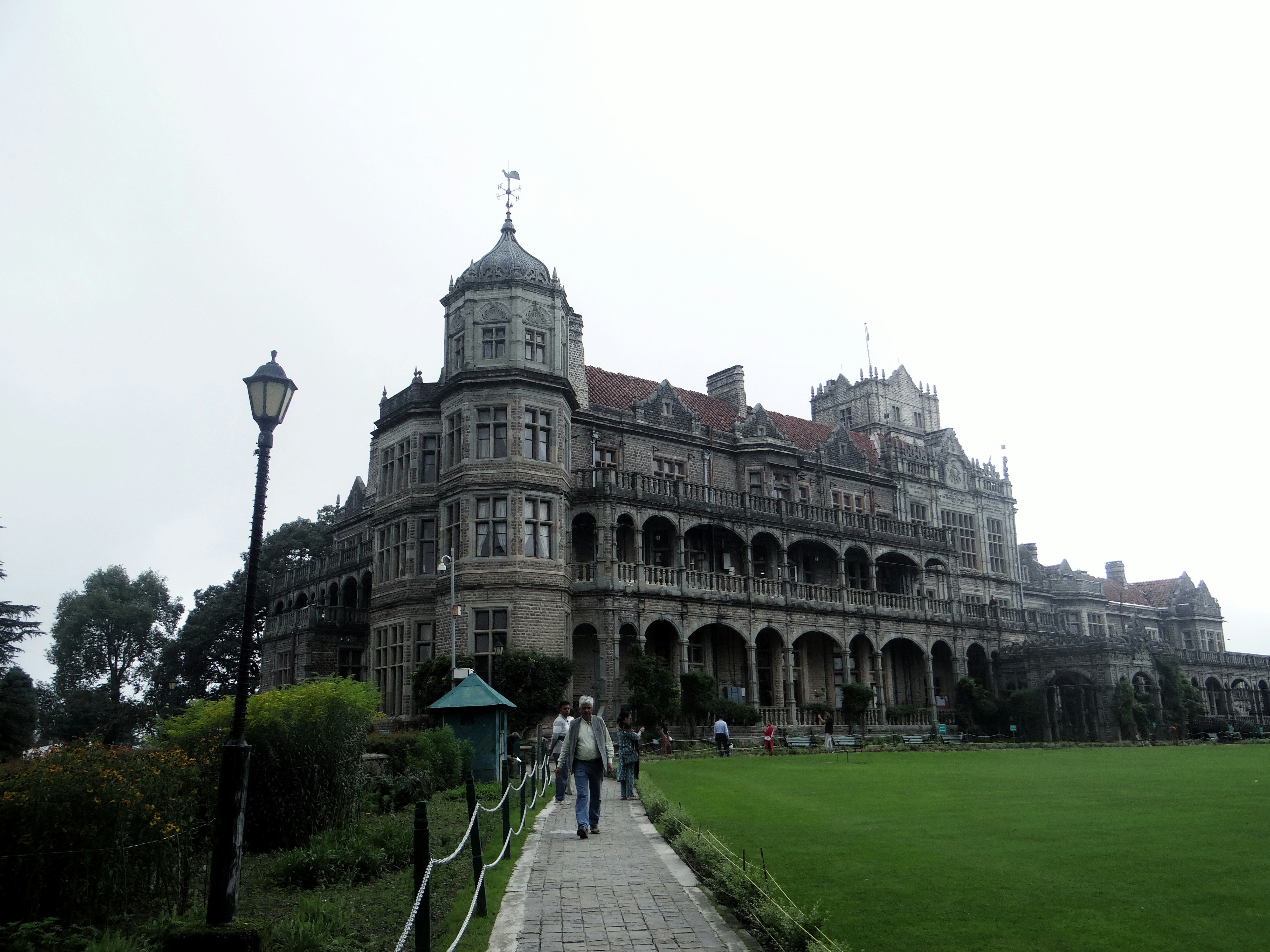 Historic Terrace Castle: A Gothic-Wotham Facade Overlooking a Lush Lawn