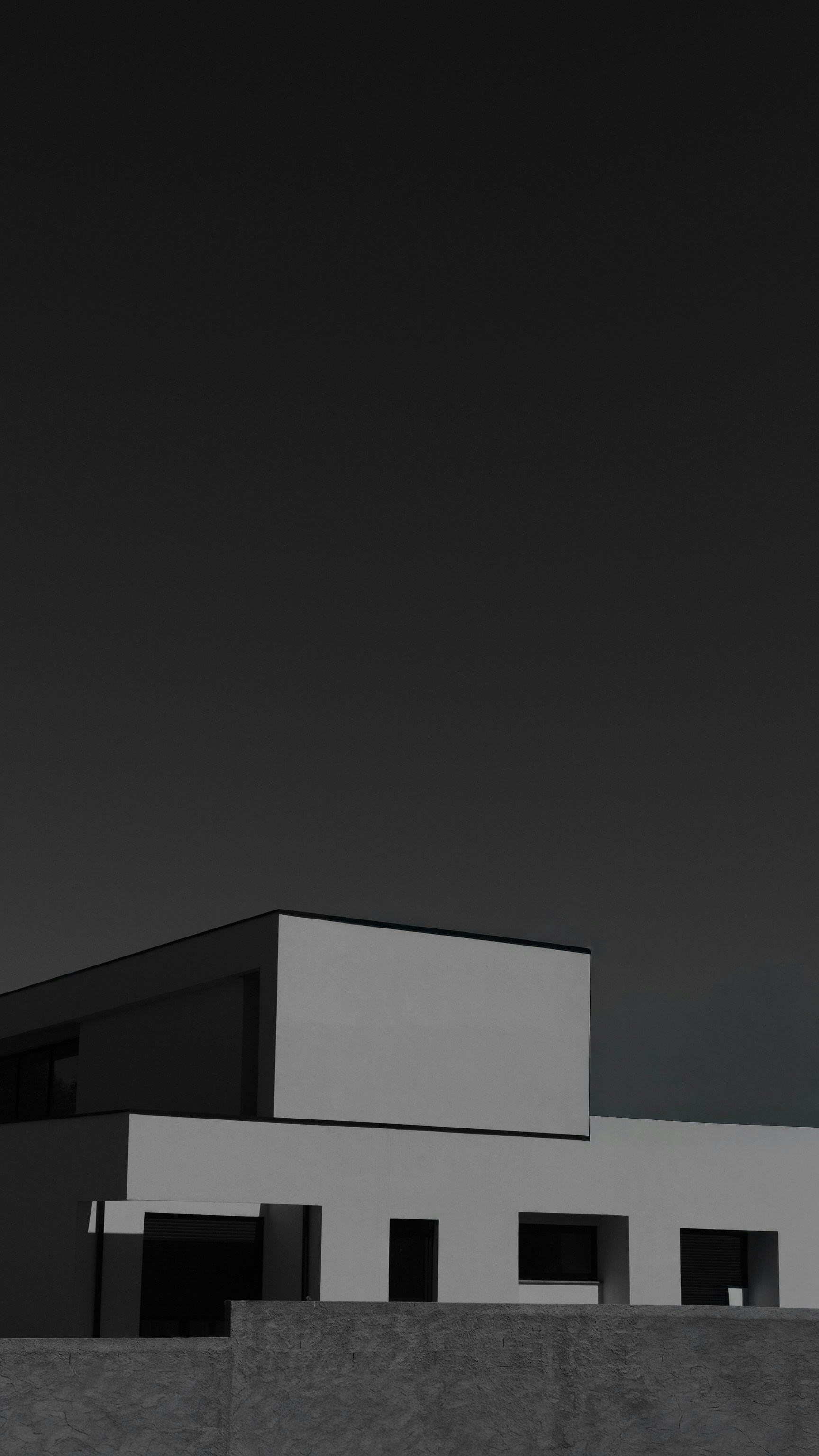 Monochrome Geometry: A Modern Facade in Quiet Light