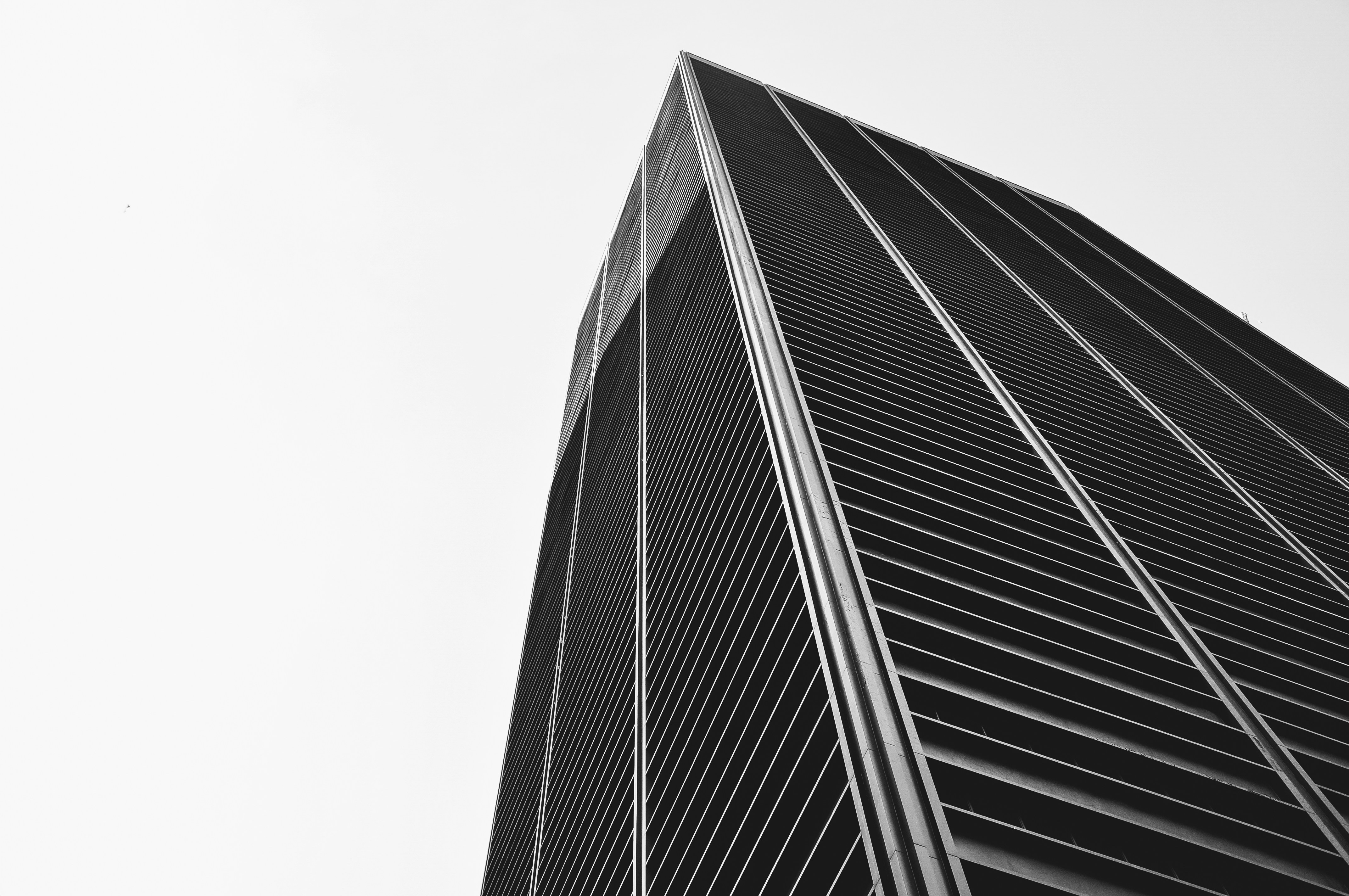 Ascendant Glass: A Tilted Peak of Modern Steel