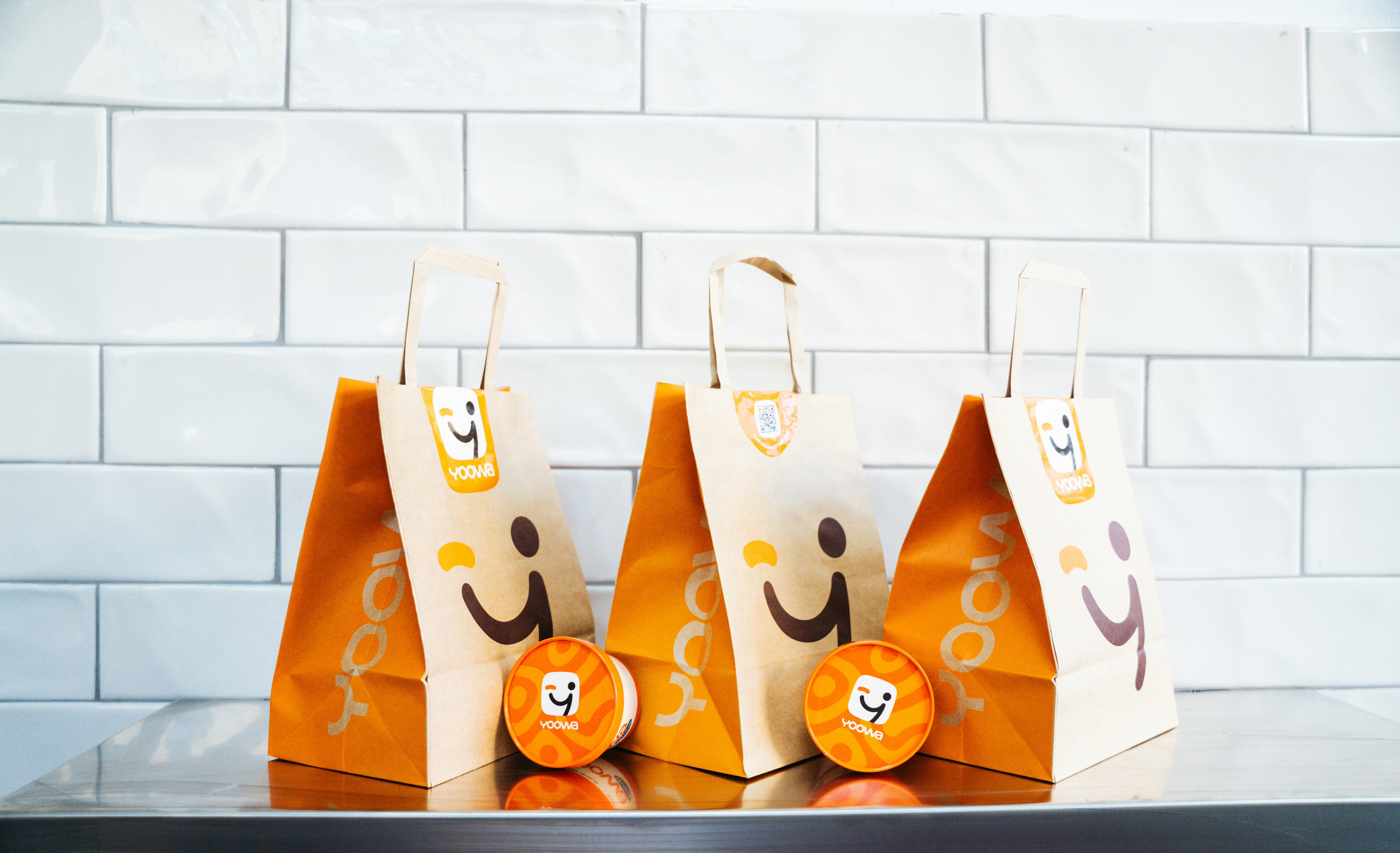 Bright Bags and Lively Orbs: A Minimalist Grocery Moment