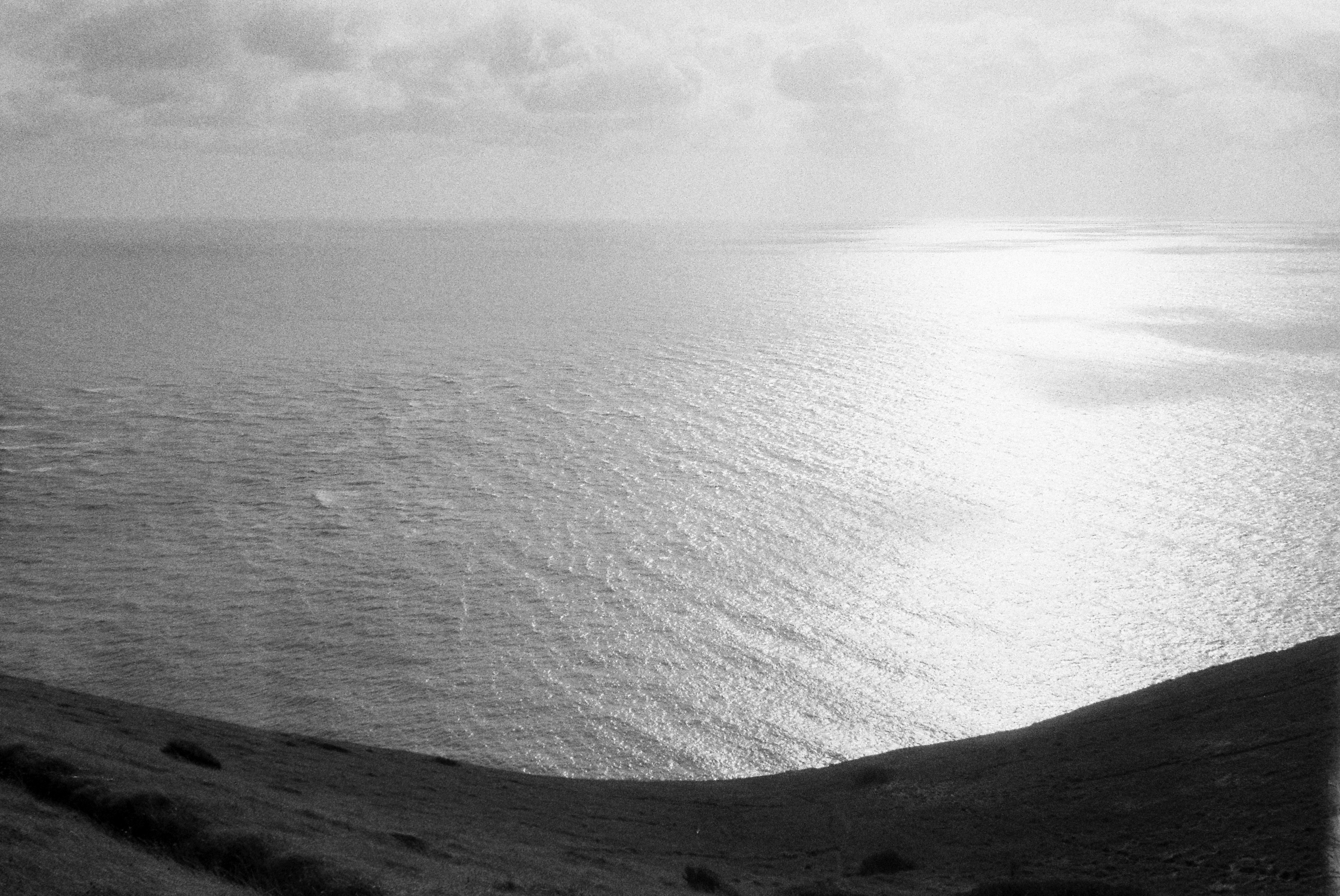 Horizon Glint over Quiet Slope