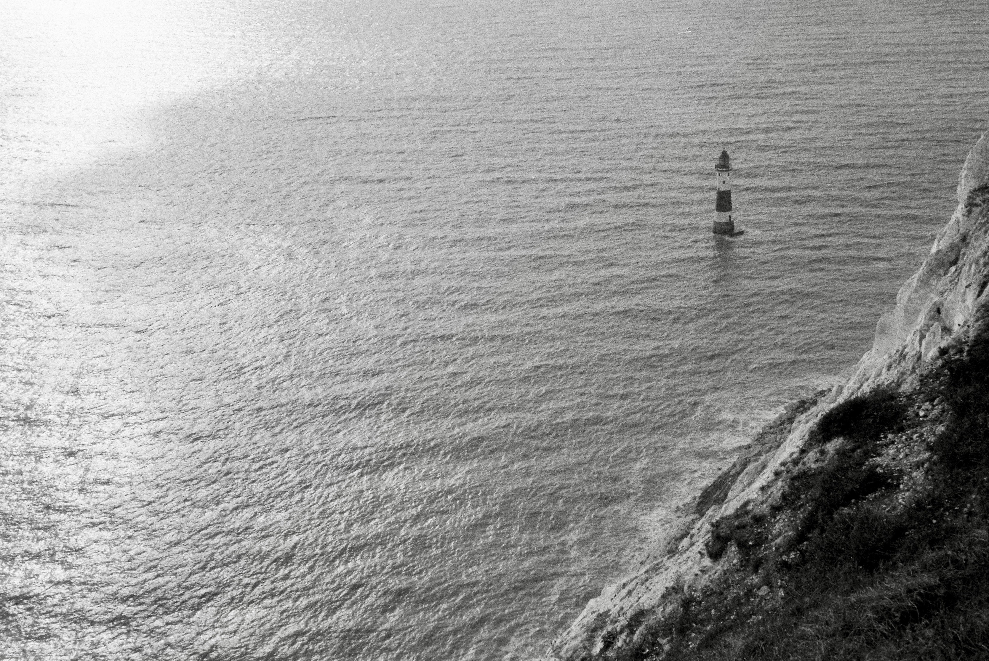 Cliffside Lighthouse Watch over a Turbulent Sea