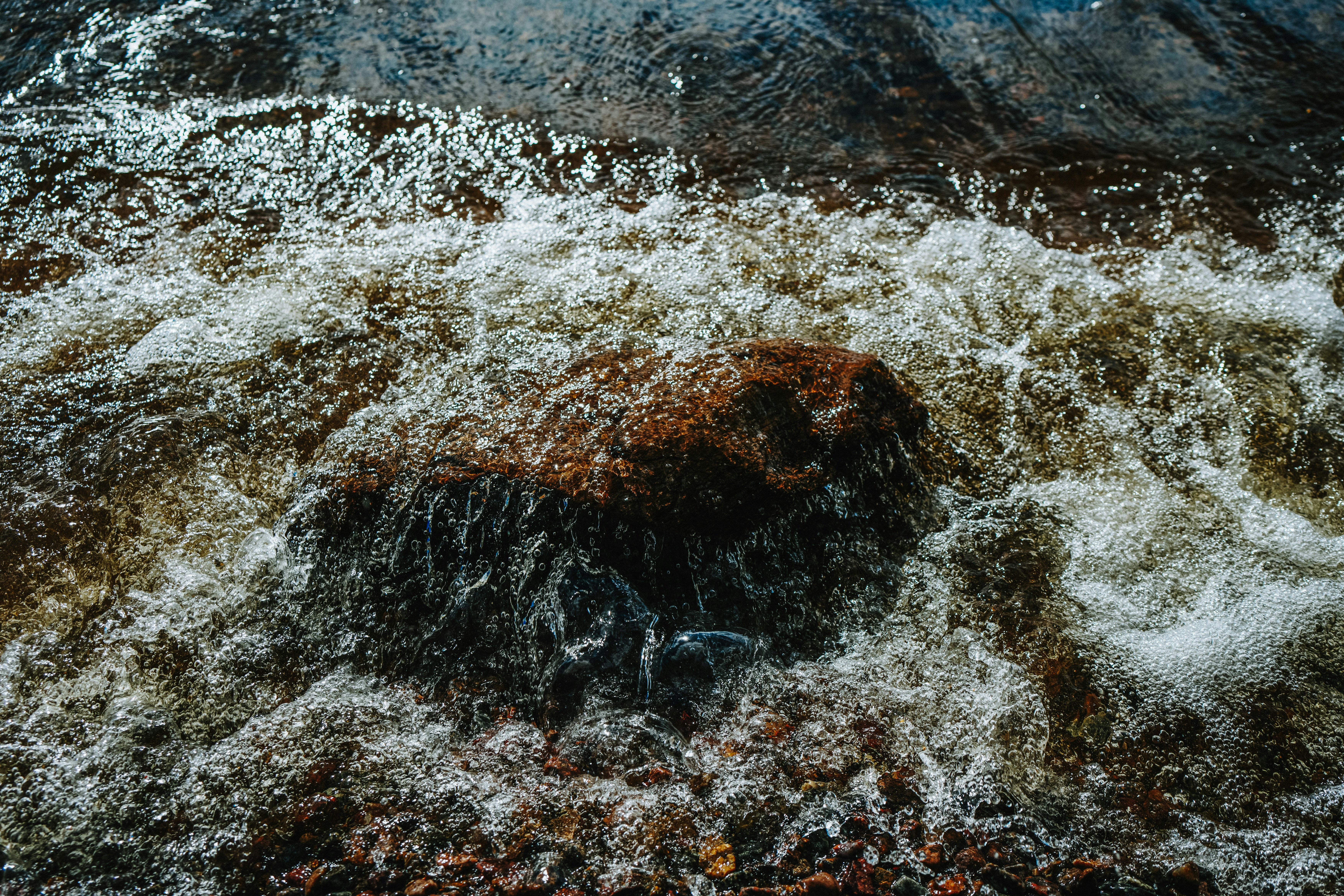 Rugged Tide over a Hidden Rock