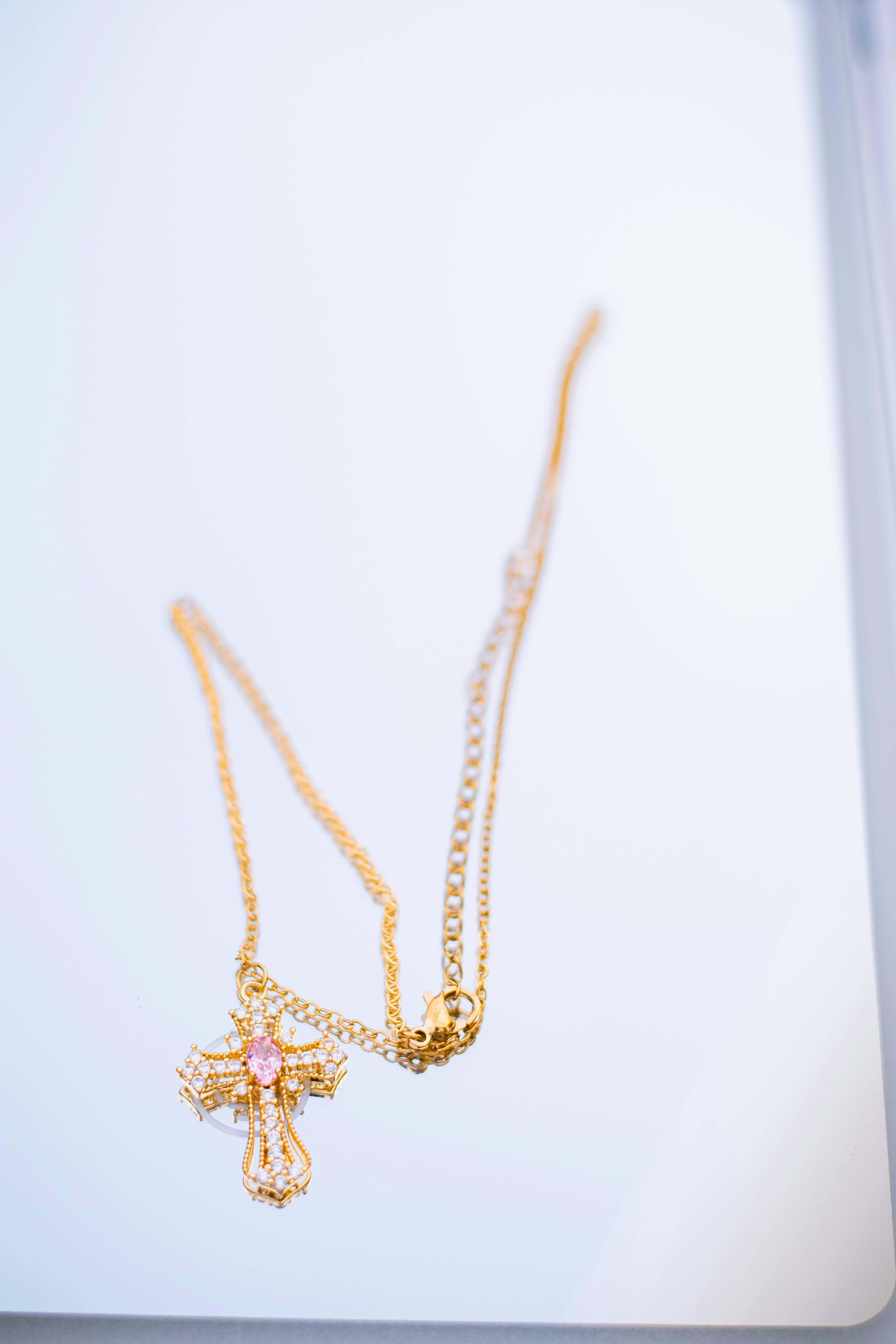 Golden Cross Pendant on a Delicate Chain