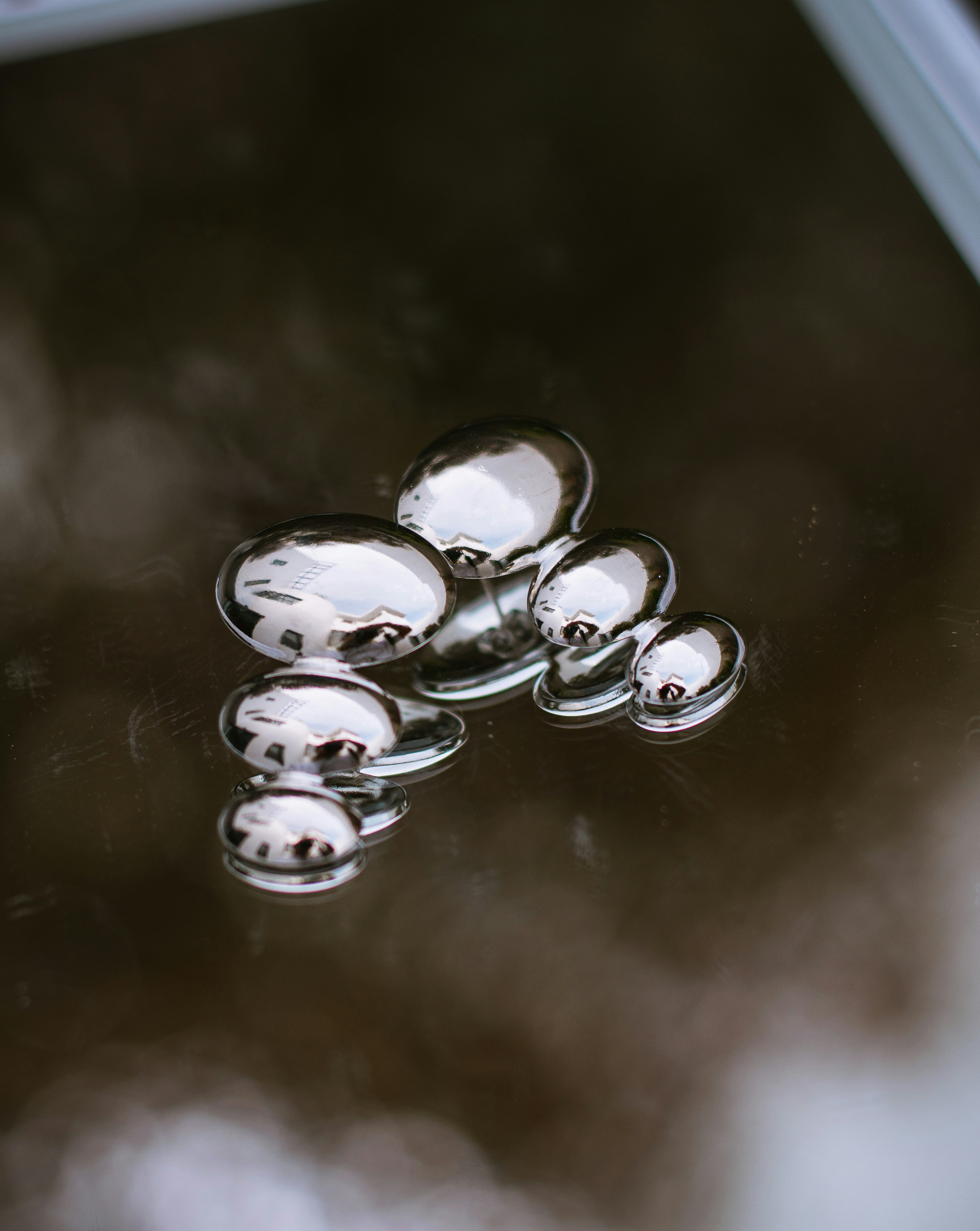 Chrome Bubbles: A Quiet Stack of Beaded Reflections