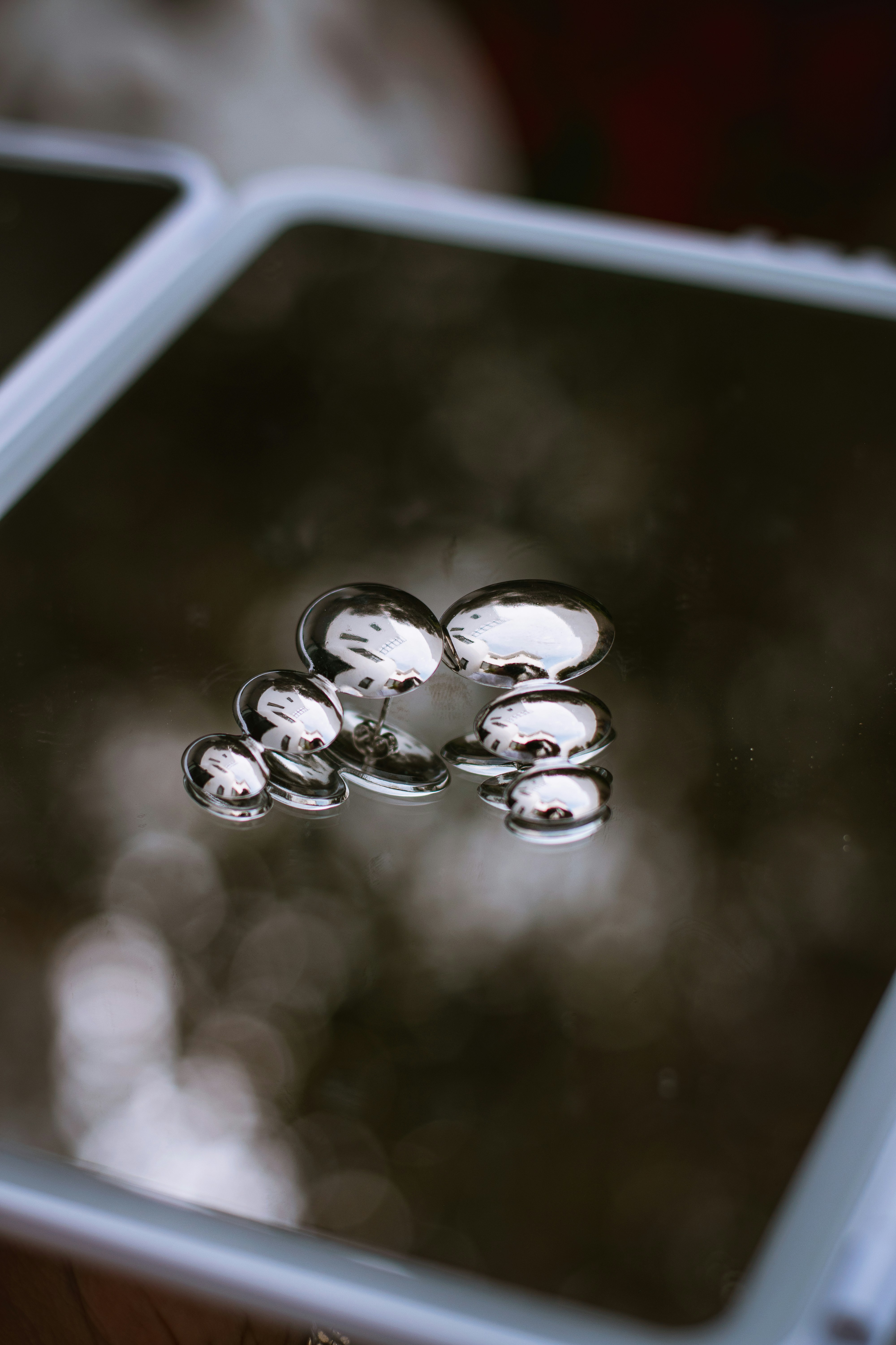 Mirror Spheres on a Glassy Stage