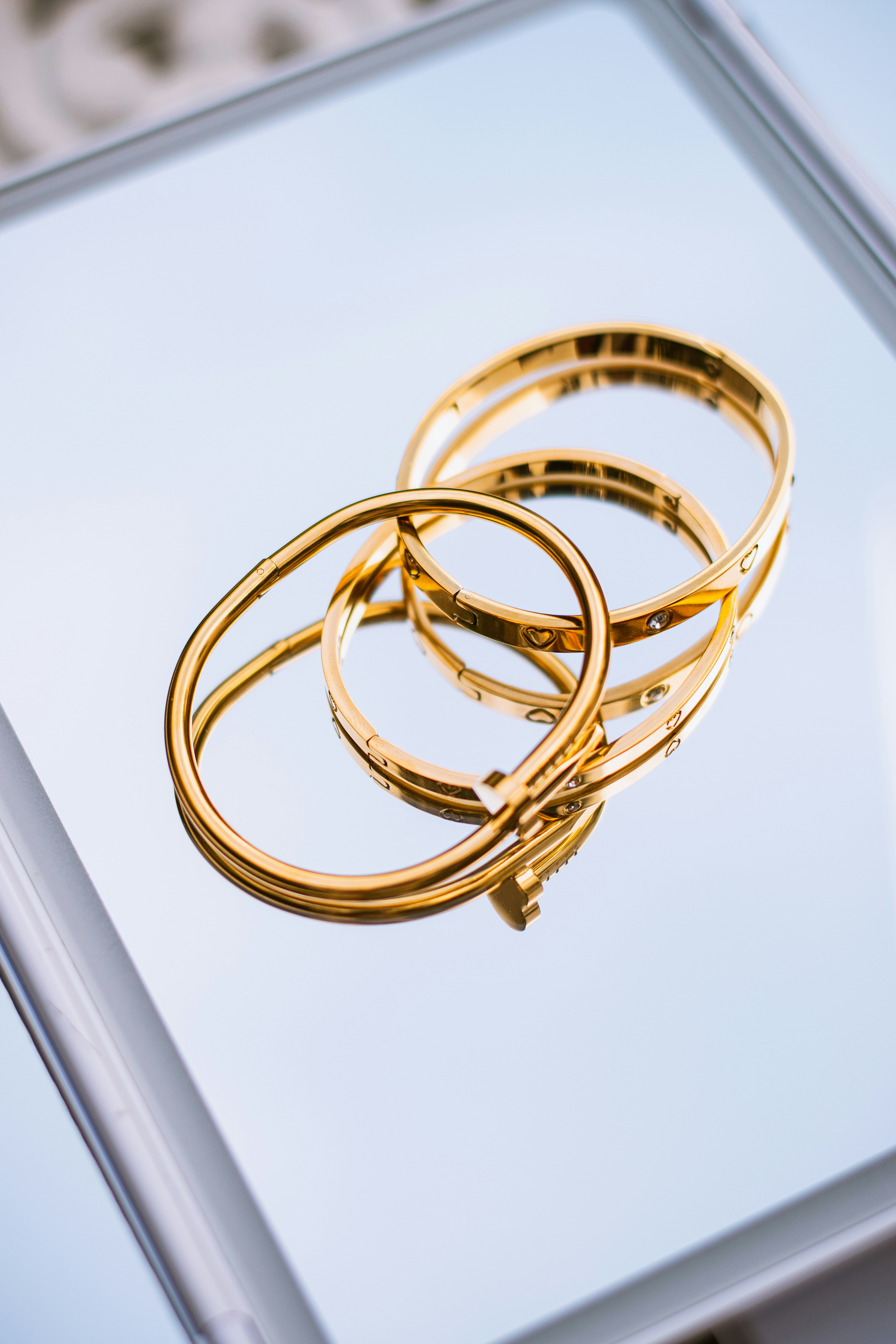 Golden Rings on Glass: Reflections of Luxury