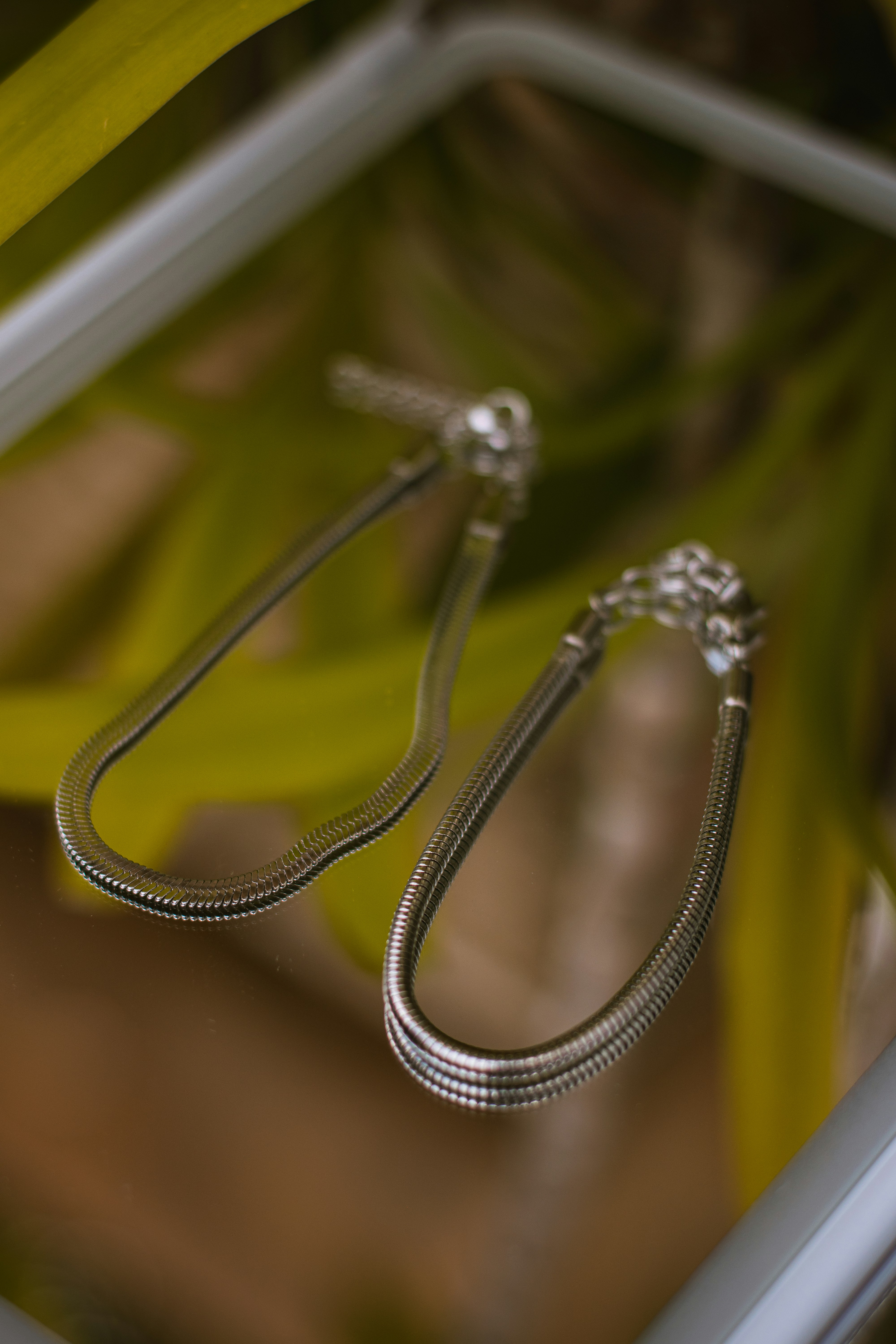 Curved Metal Threads in a Plant Nest