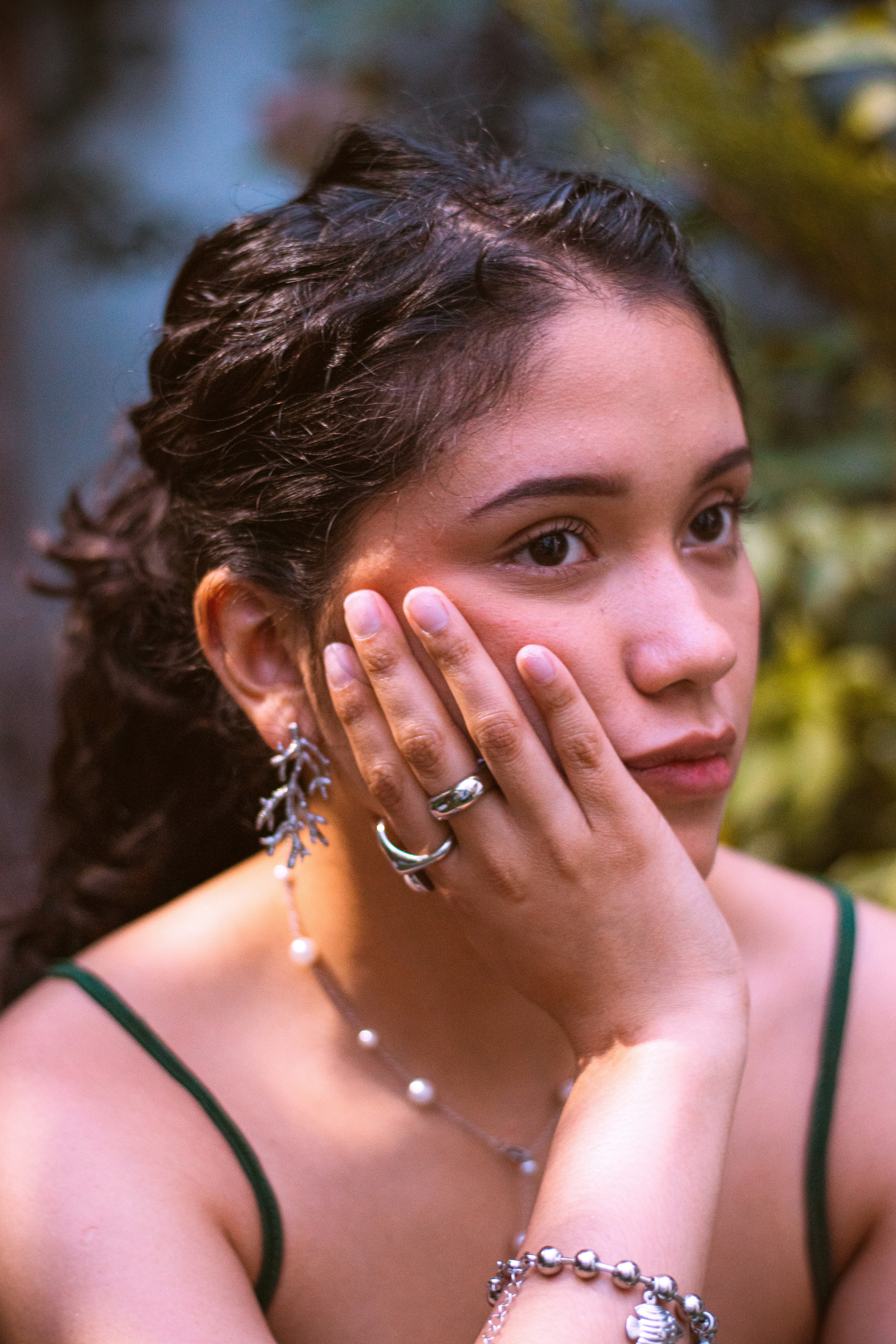 Pose of Quiet Reflection: A Portrait of Soft Light on a Thoughtful Face