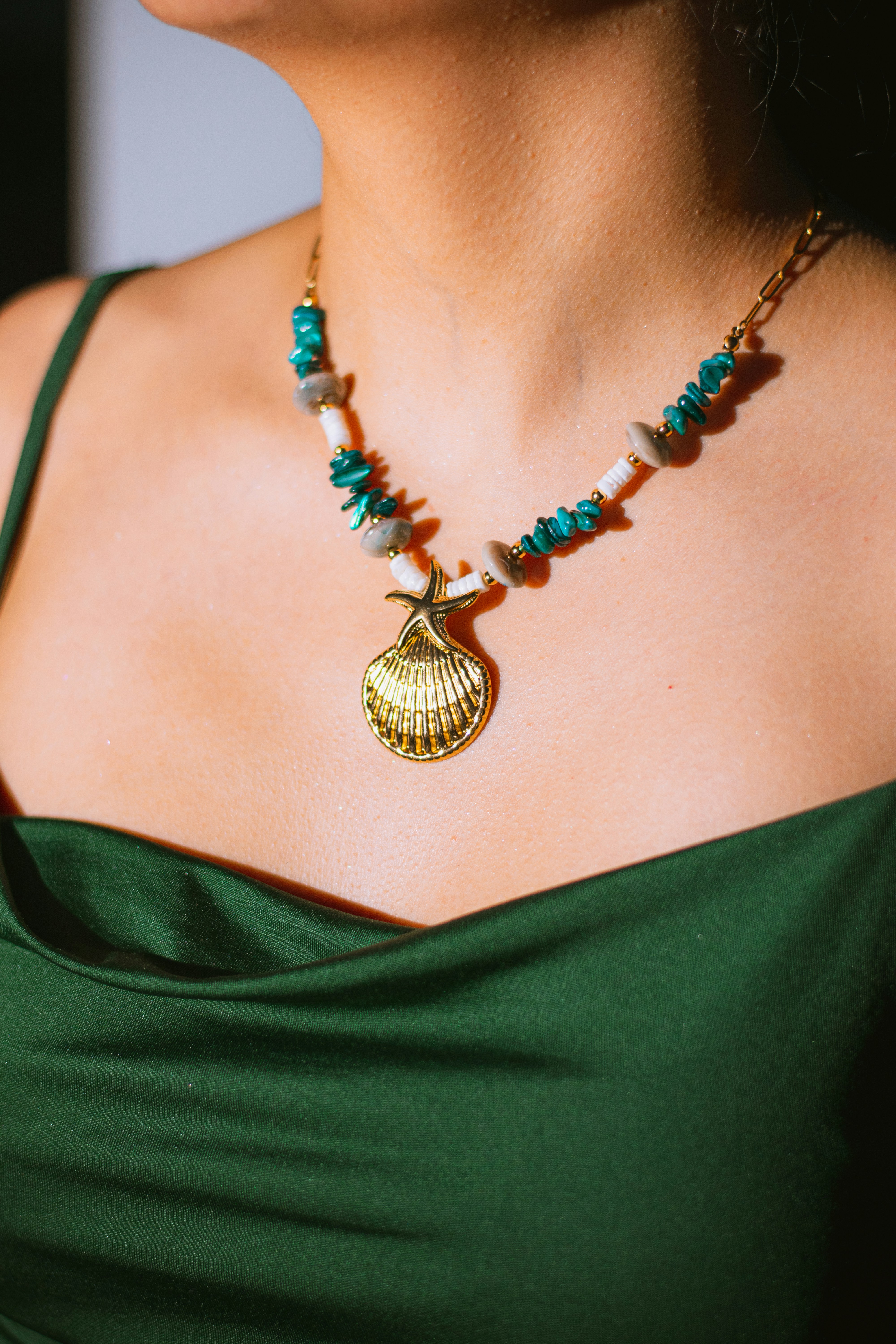 Teal Beads and Golden Seashell Pendant