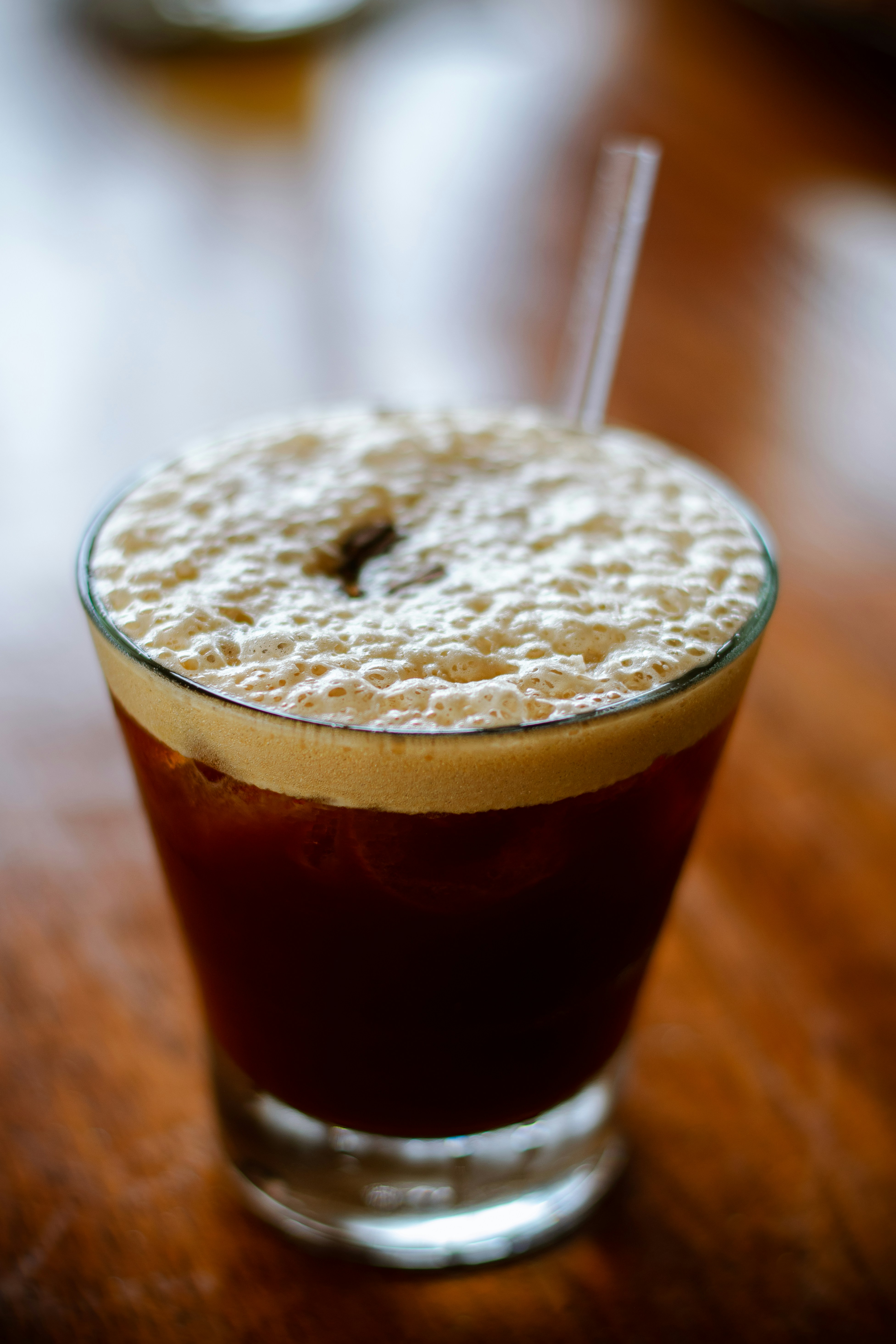 Creamy Crown: A Glass of Cold Brew with Foam