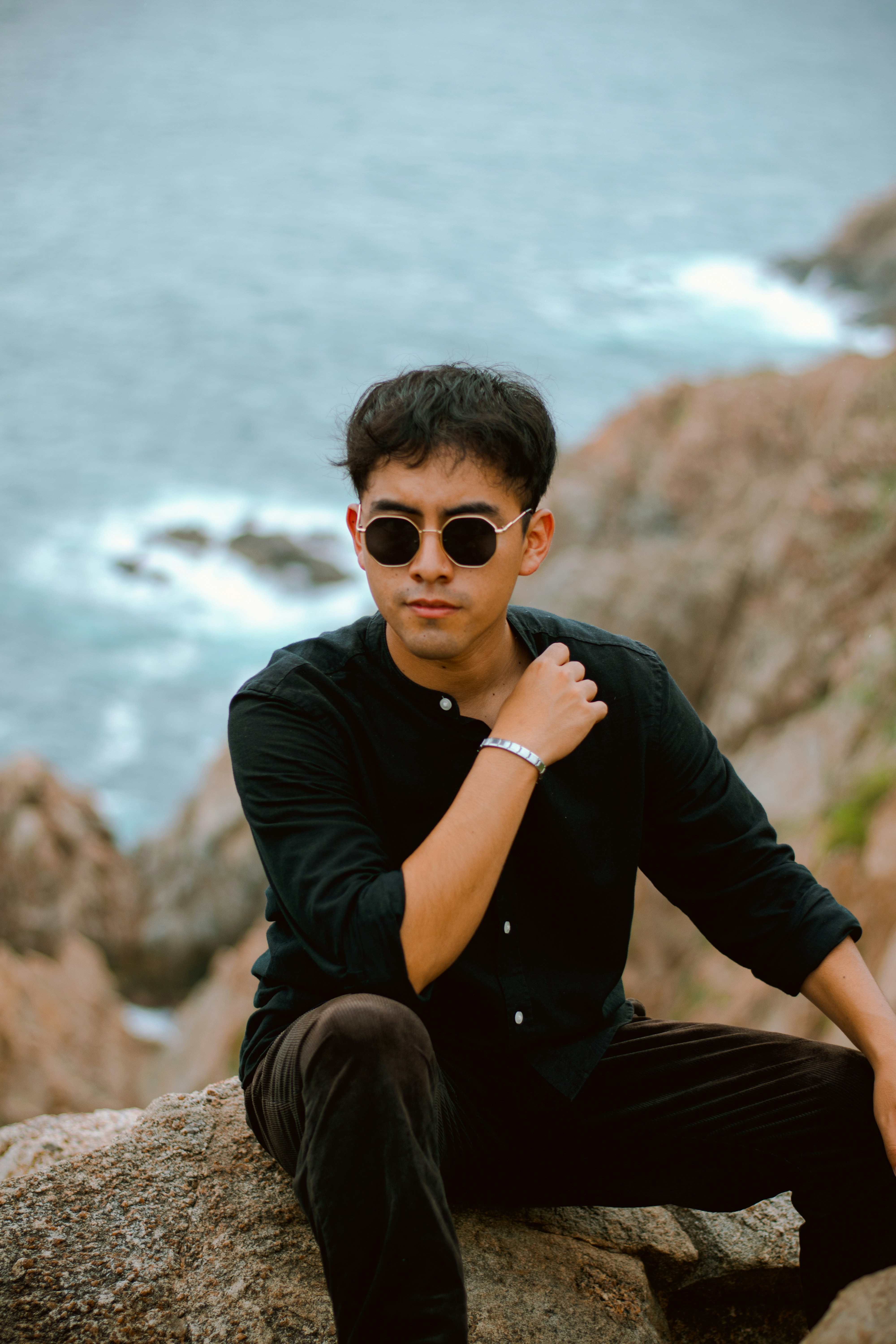 Coastal Quiet: A Shadowed Portrait by the Cliffs